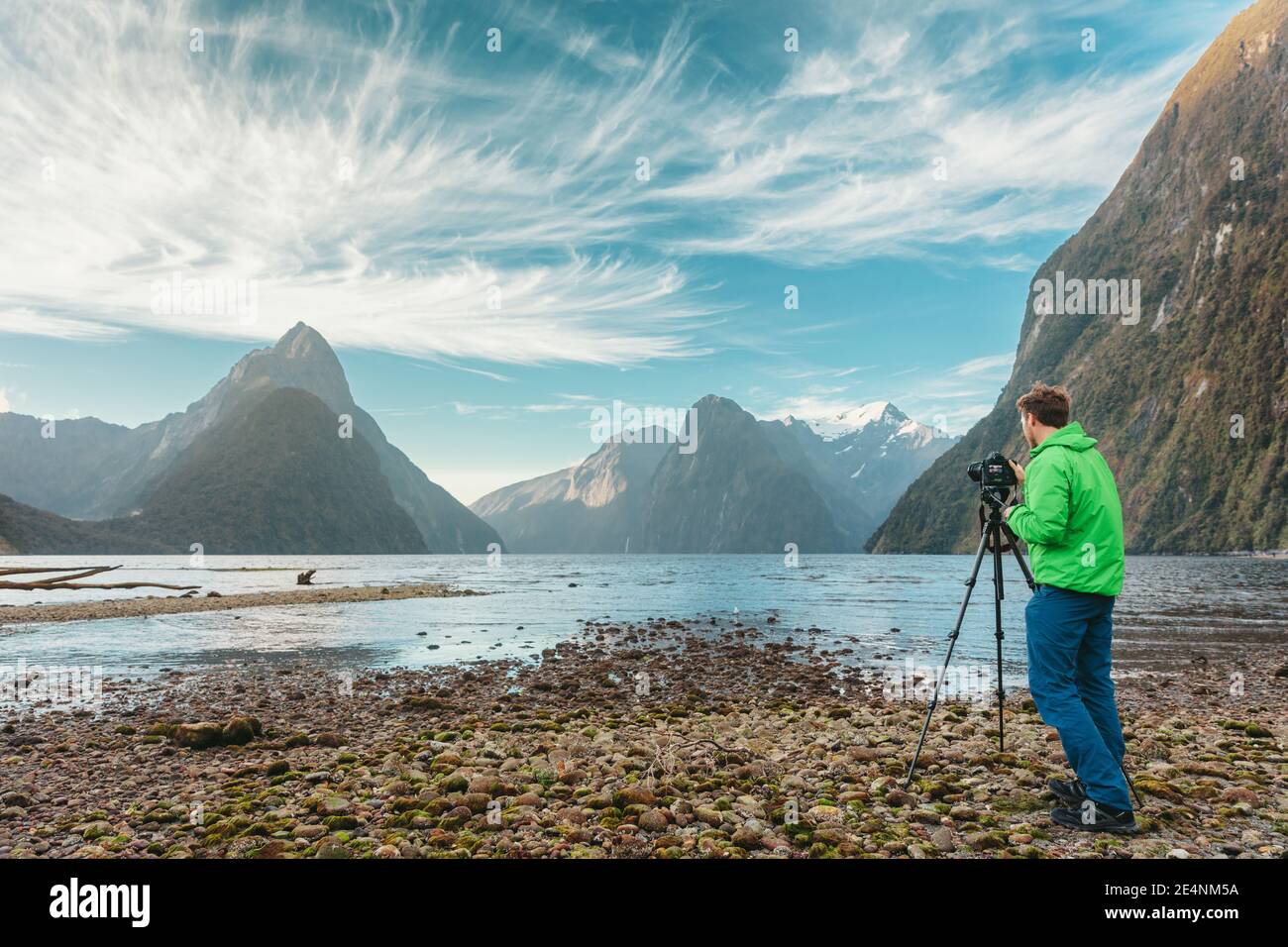 Tourist travel photographer taking pictures with professional camera on ...