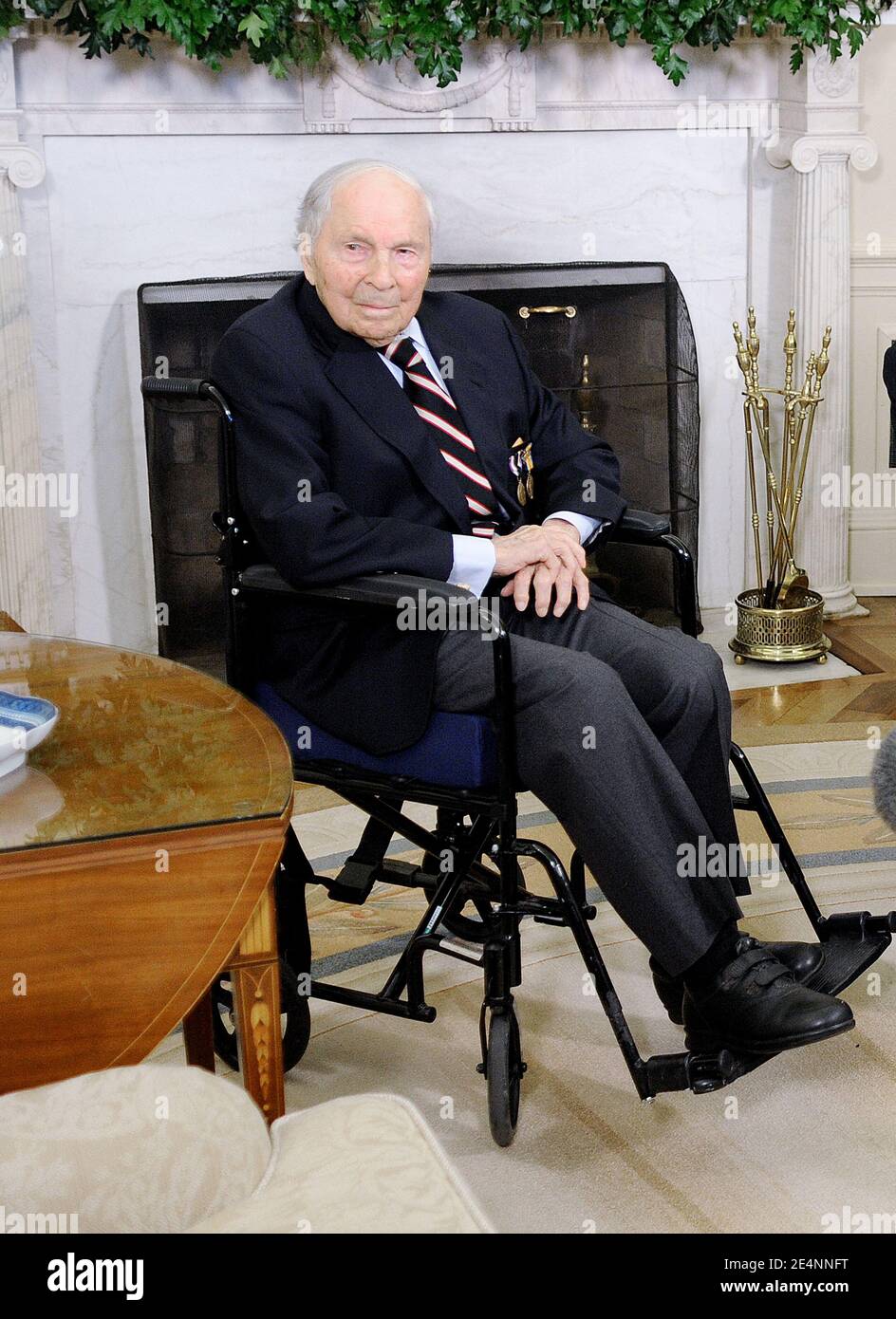 FILE - President George W. Bush participates in a photo op with ...