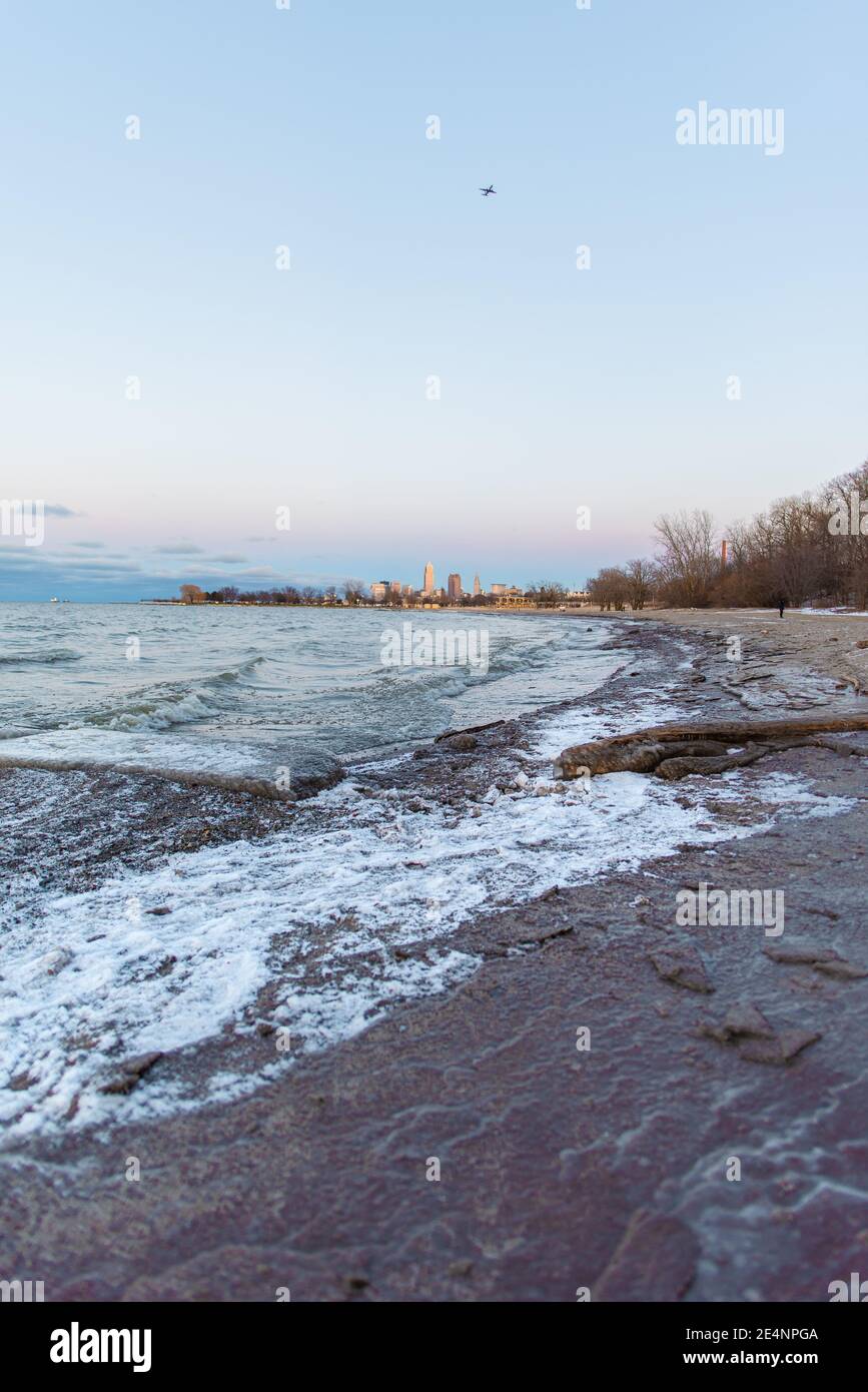 Cleveland Ohio skyline from the beach during winter edgewater park ...