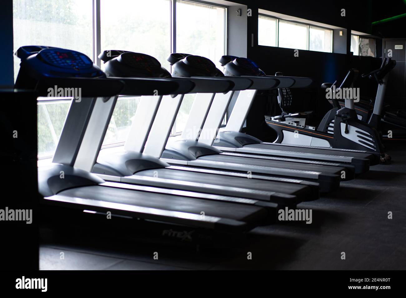Empty treadmill standing gym near big window Nobody Fitness sport ...