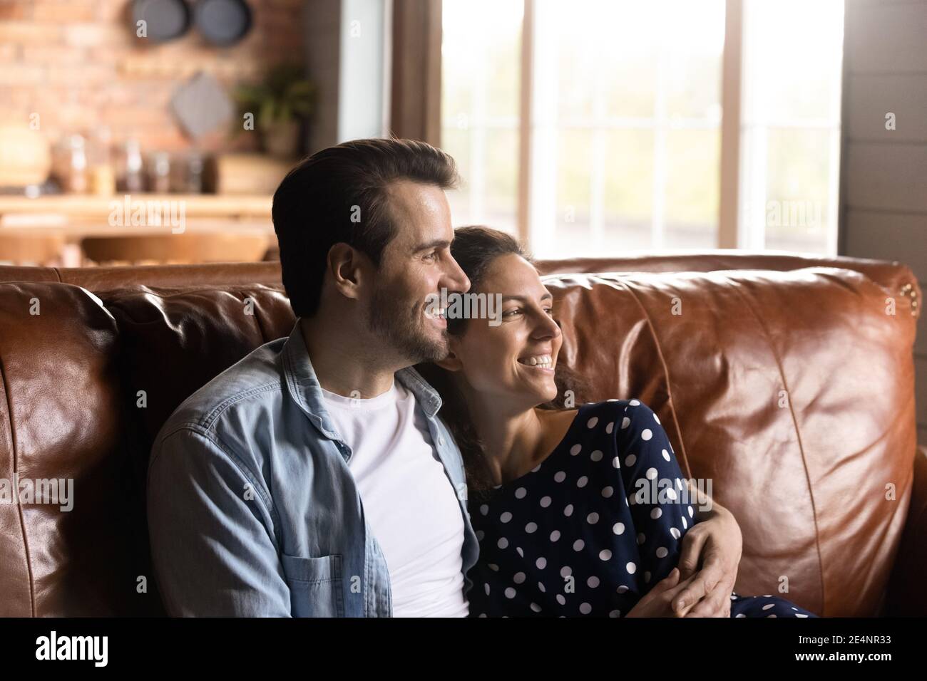 Dreaming smile smiling sofa hi-res stock photography and images - Alamy