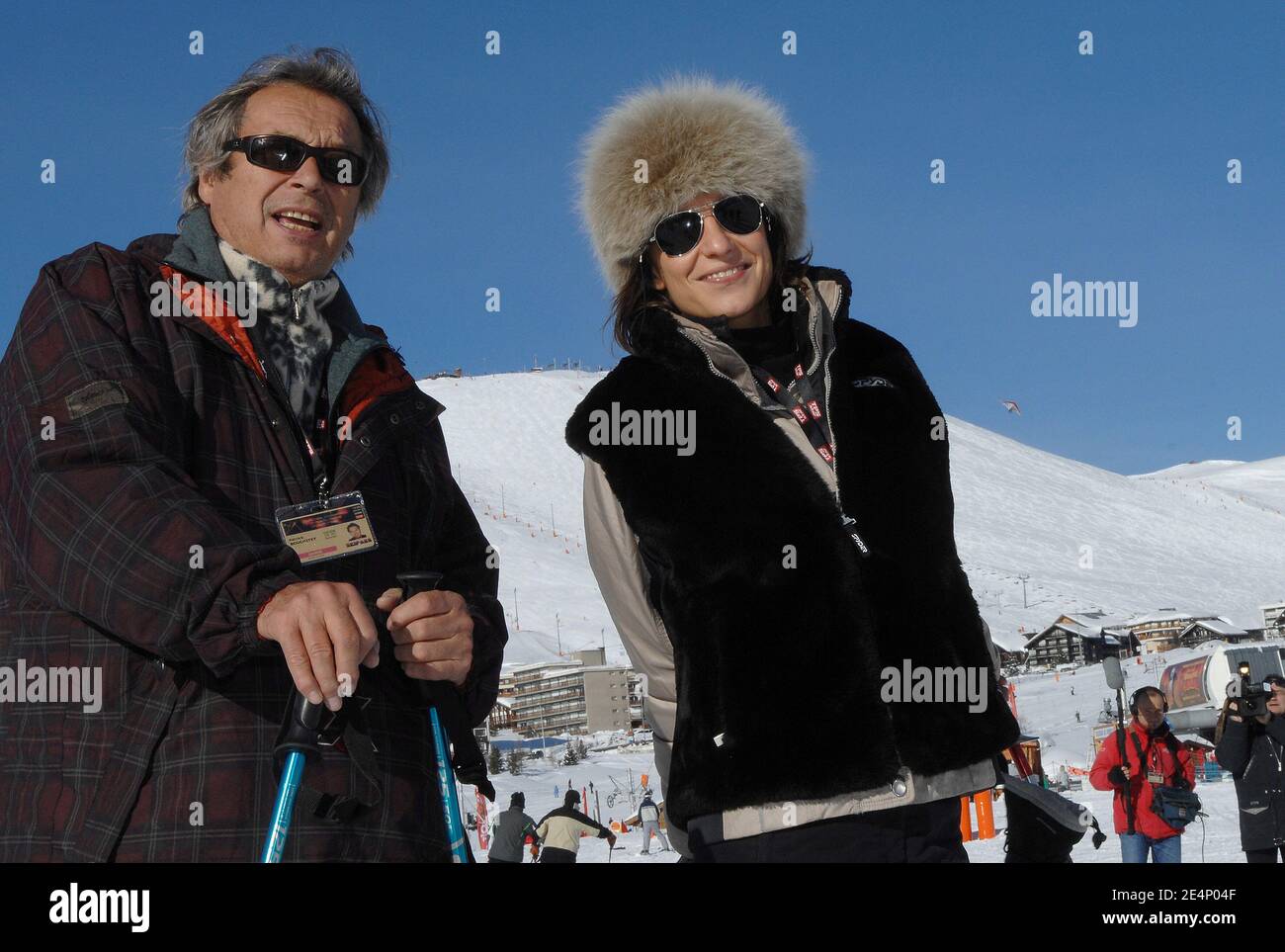 French actor Patrick Bouchitey and his wife skiing during the 11th ...