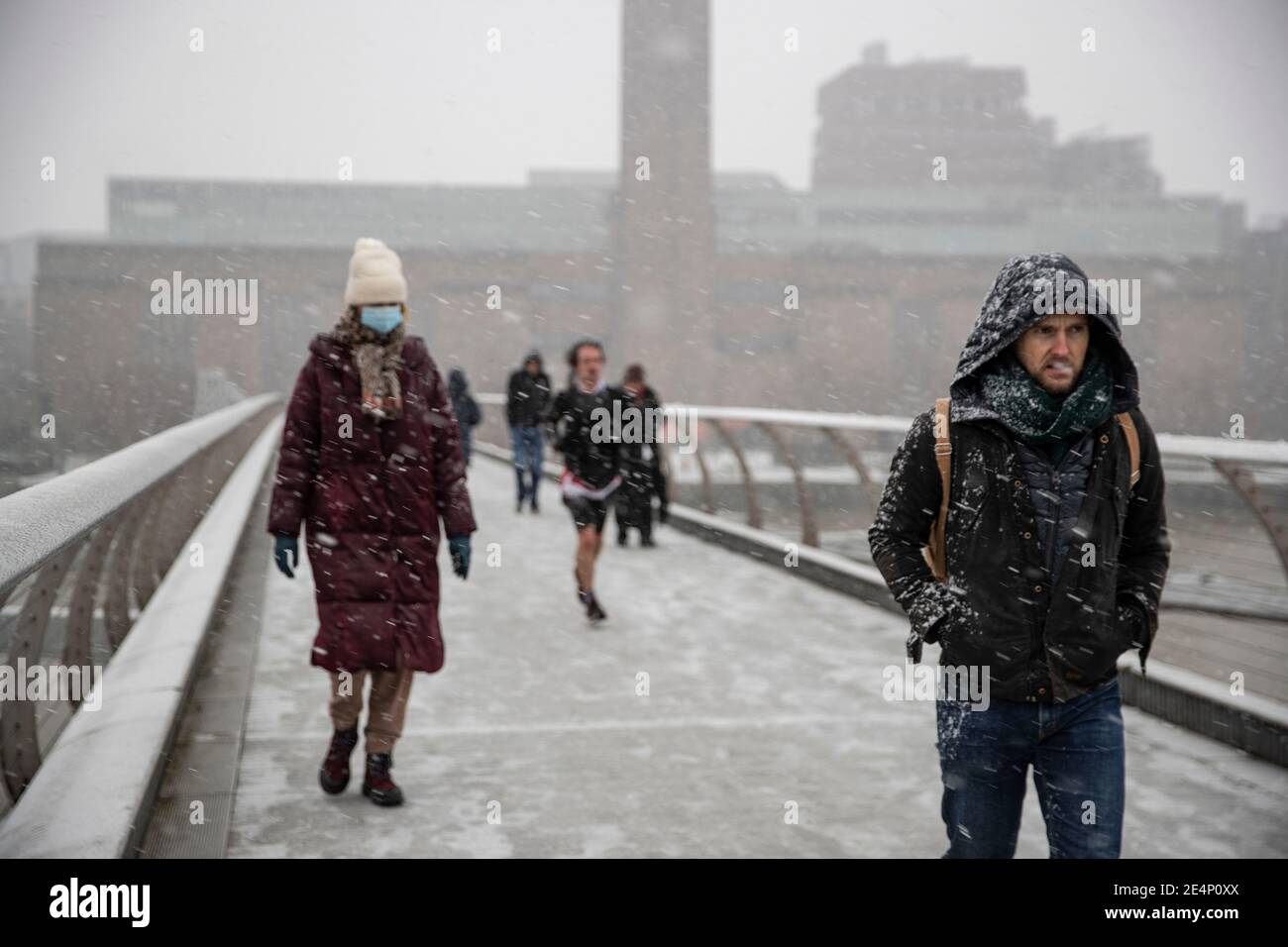 London, UK. 24th Jan, 2021. A general scene of people walking under the ...