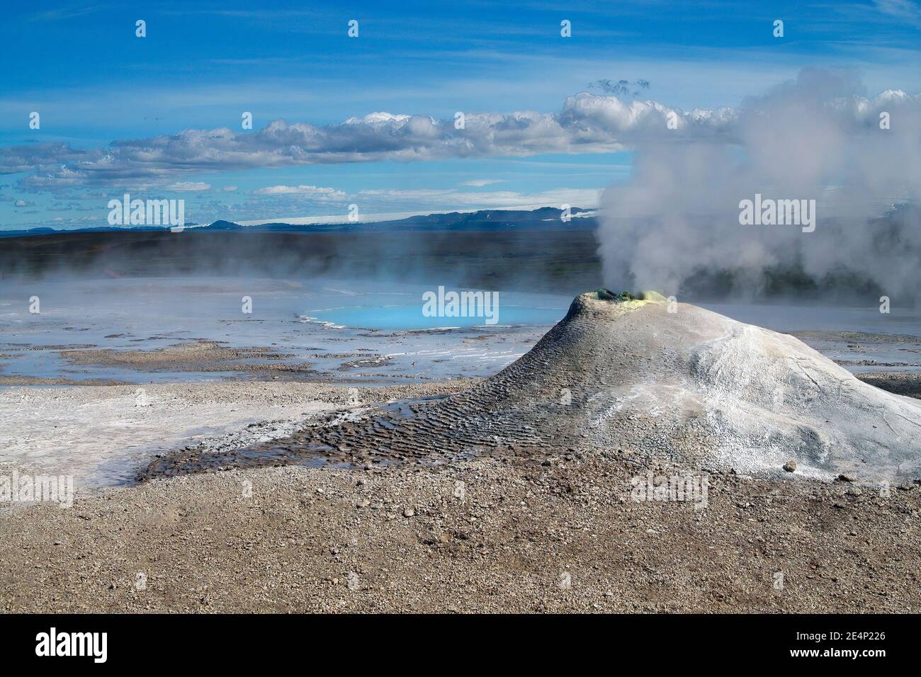 View on white fumarole mini volcano crater cone geyser emitting ...