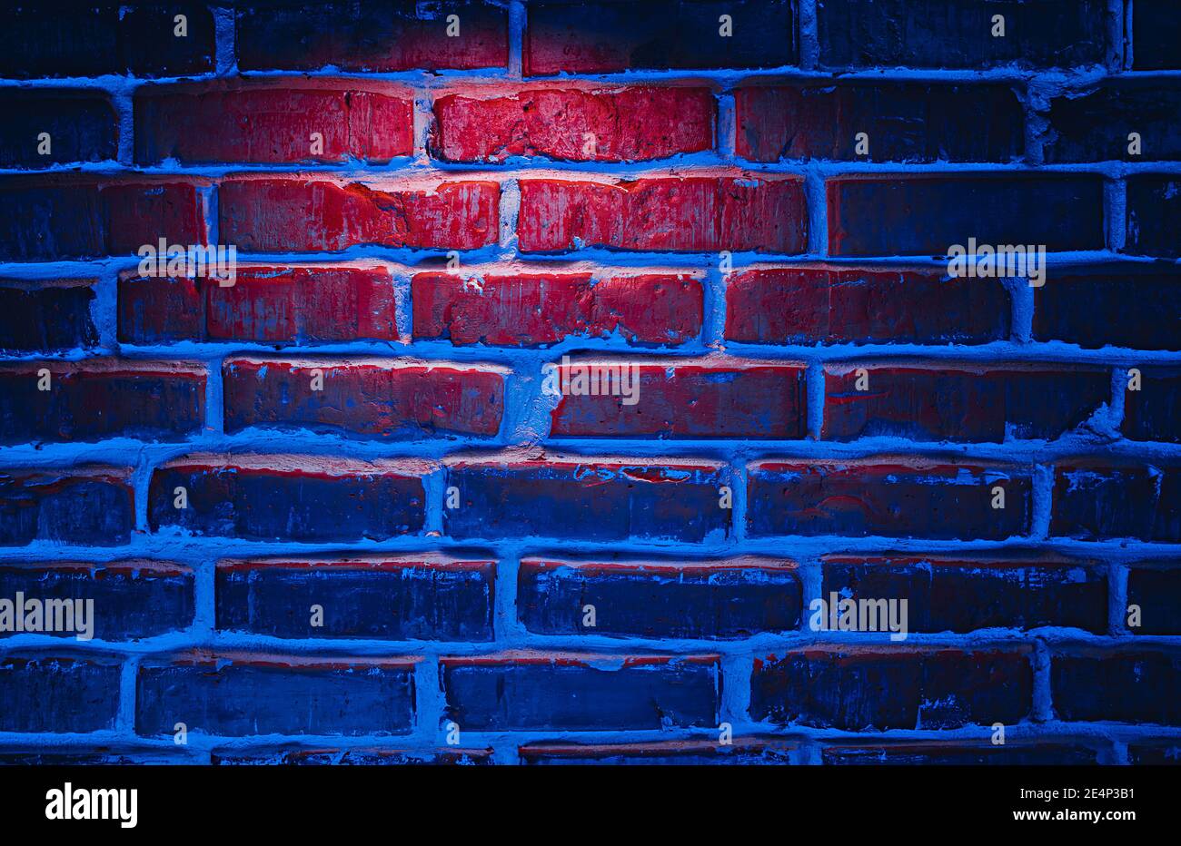 Brick wall texture background in red and blue neon lights Stock Photo ...