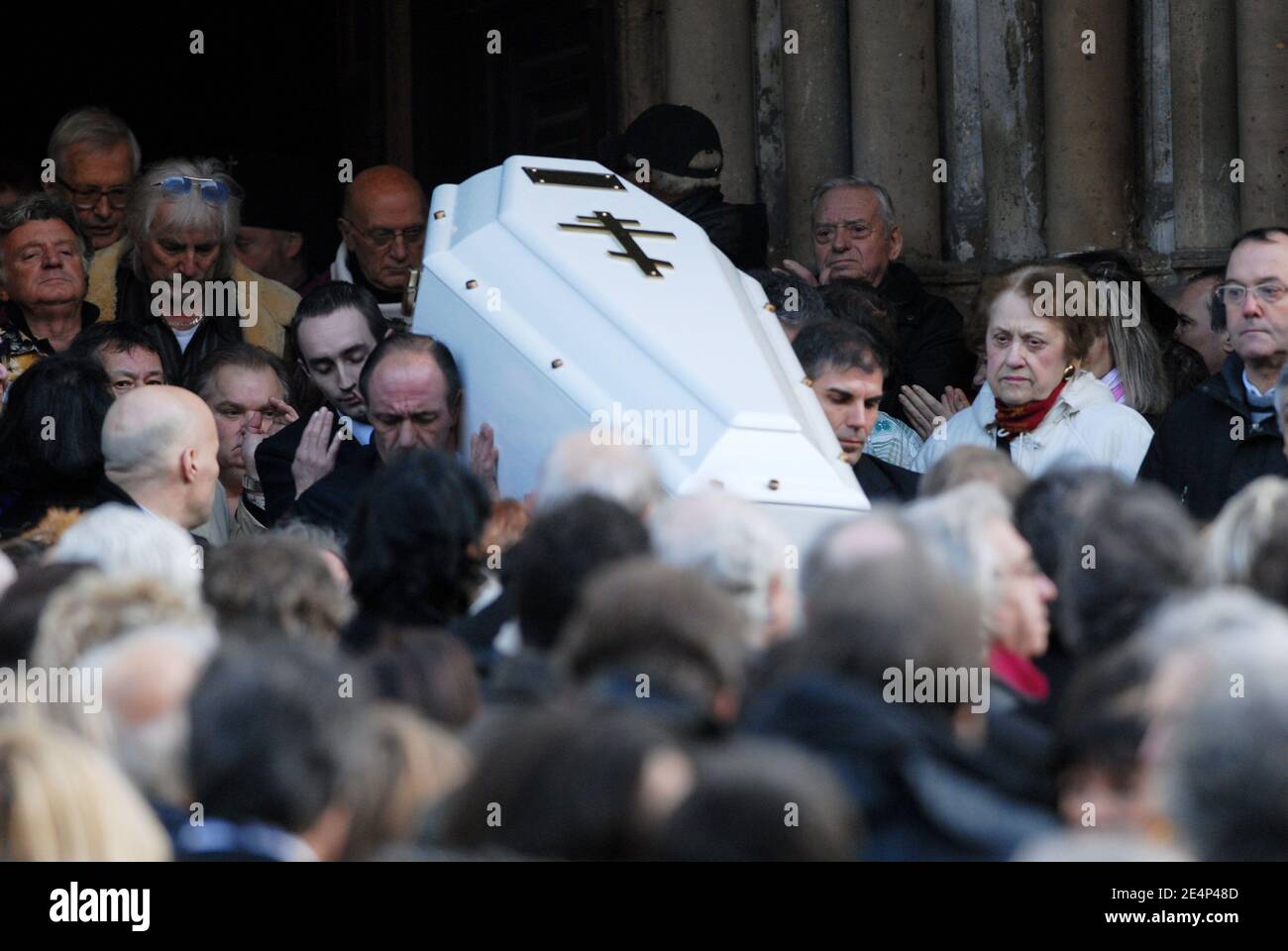 The coffin is carried away of the St Germain church after the funeral ...