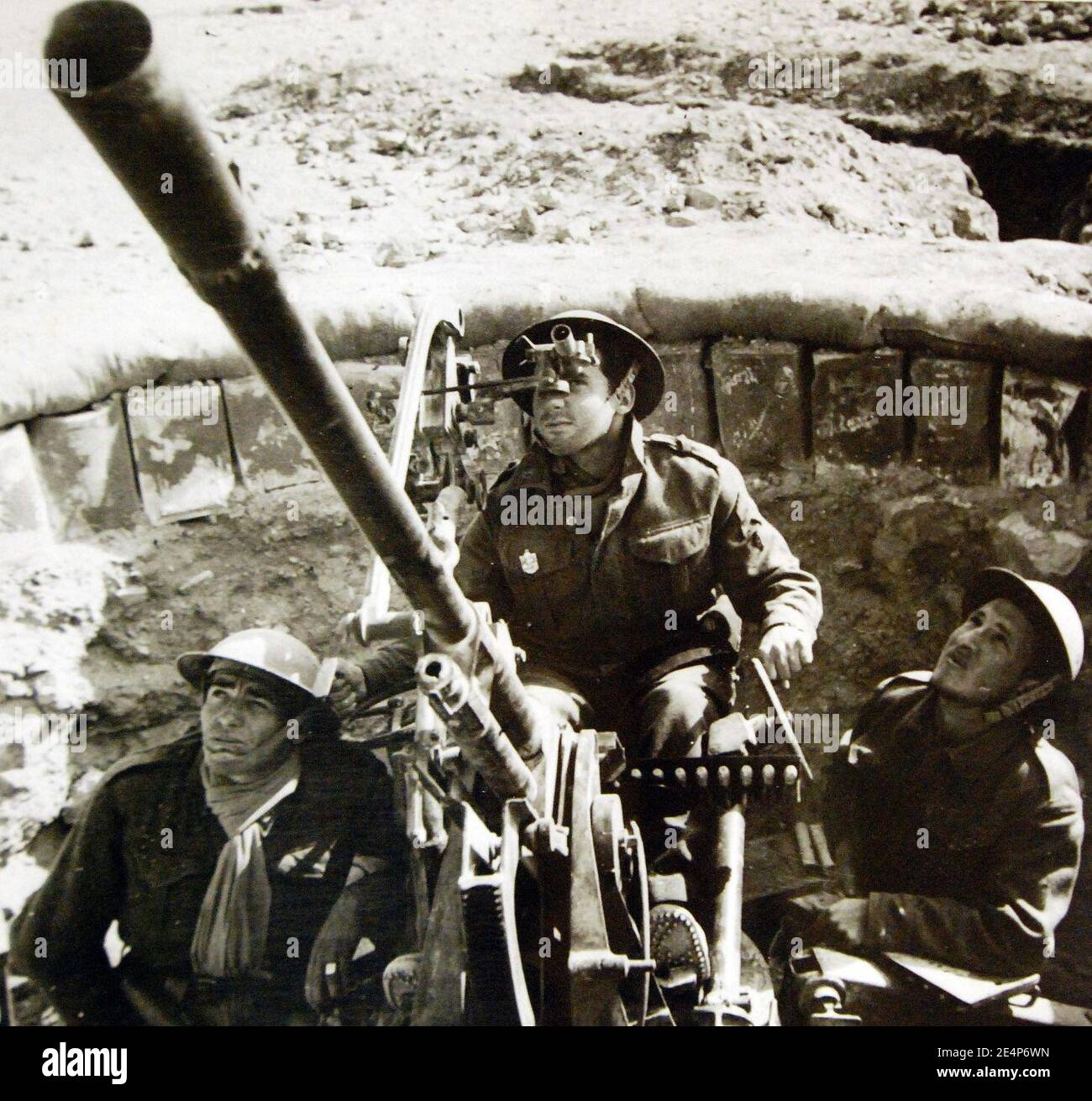 May 1942, a Free French anti-aircraft crew are using a captured Italian ...