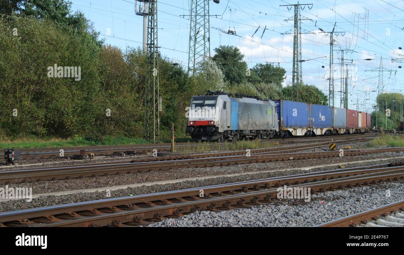 A Traxx Railpool electric powered locomotive with iso container wagons ...