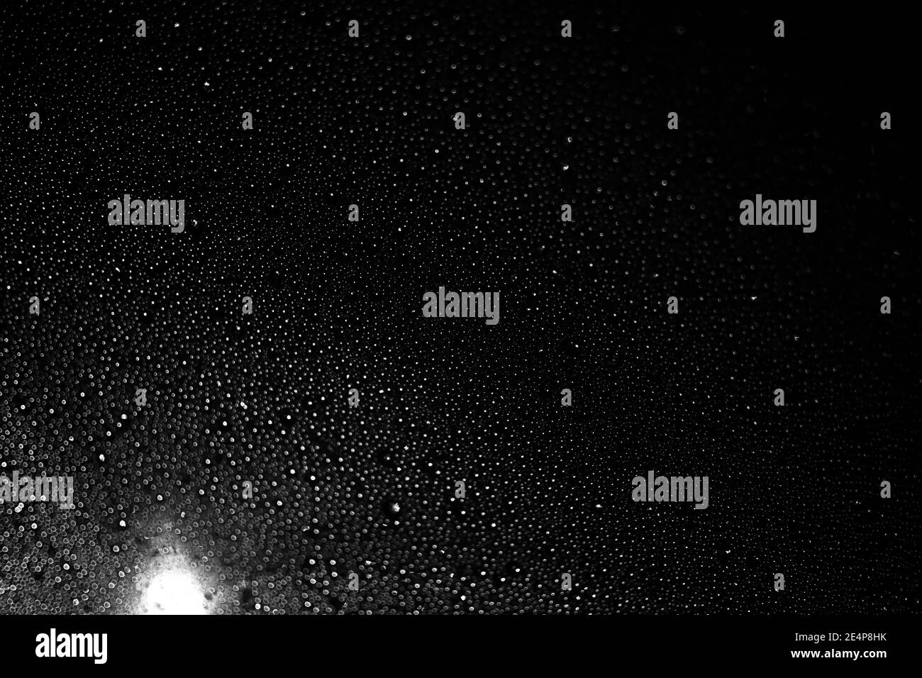 Water drops raindrops on the car window at night in autumn on a black ...