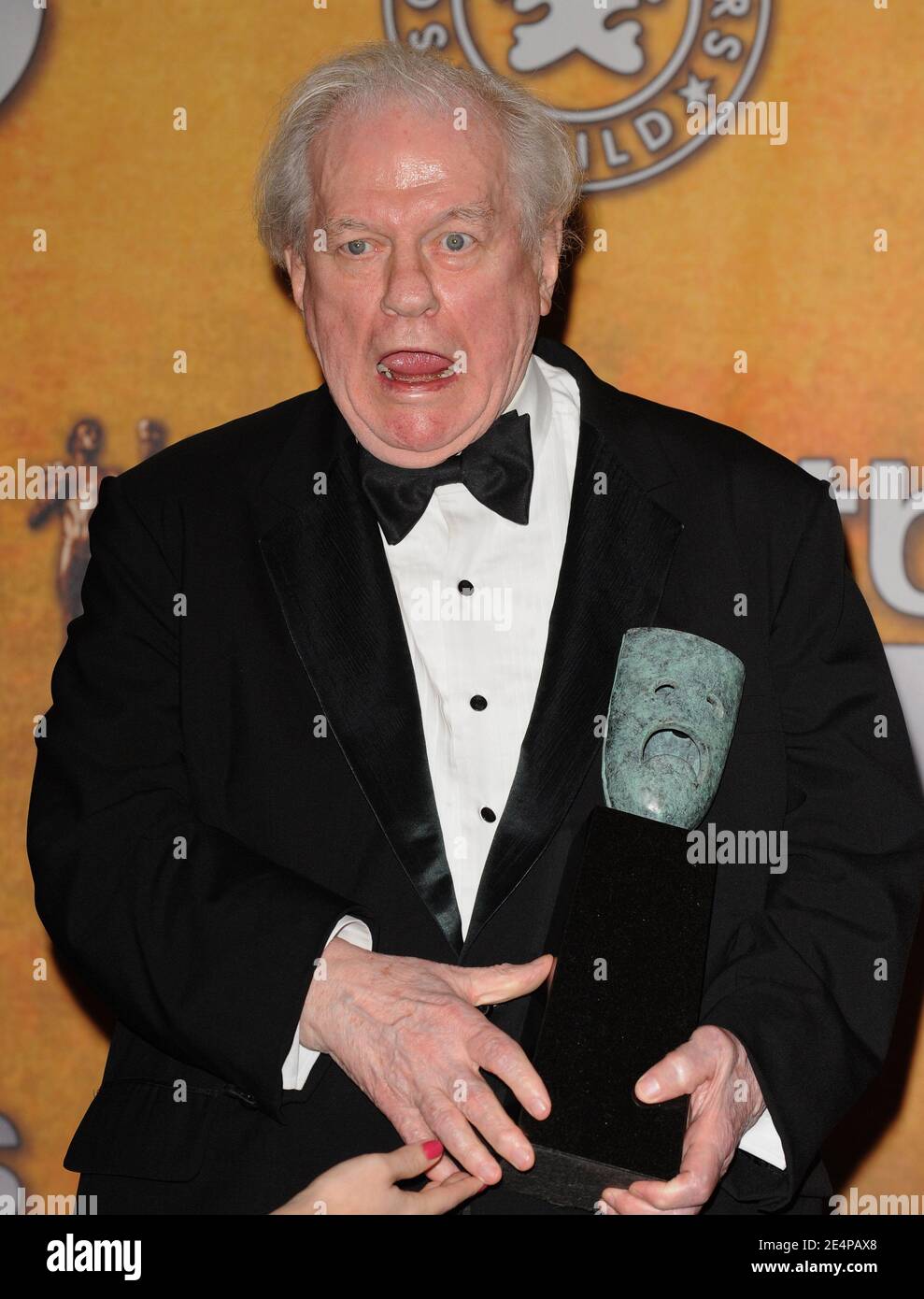 Charles Durning poses in the press room of the 14th Annual Screen ...