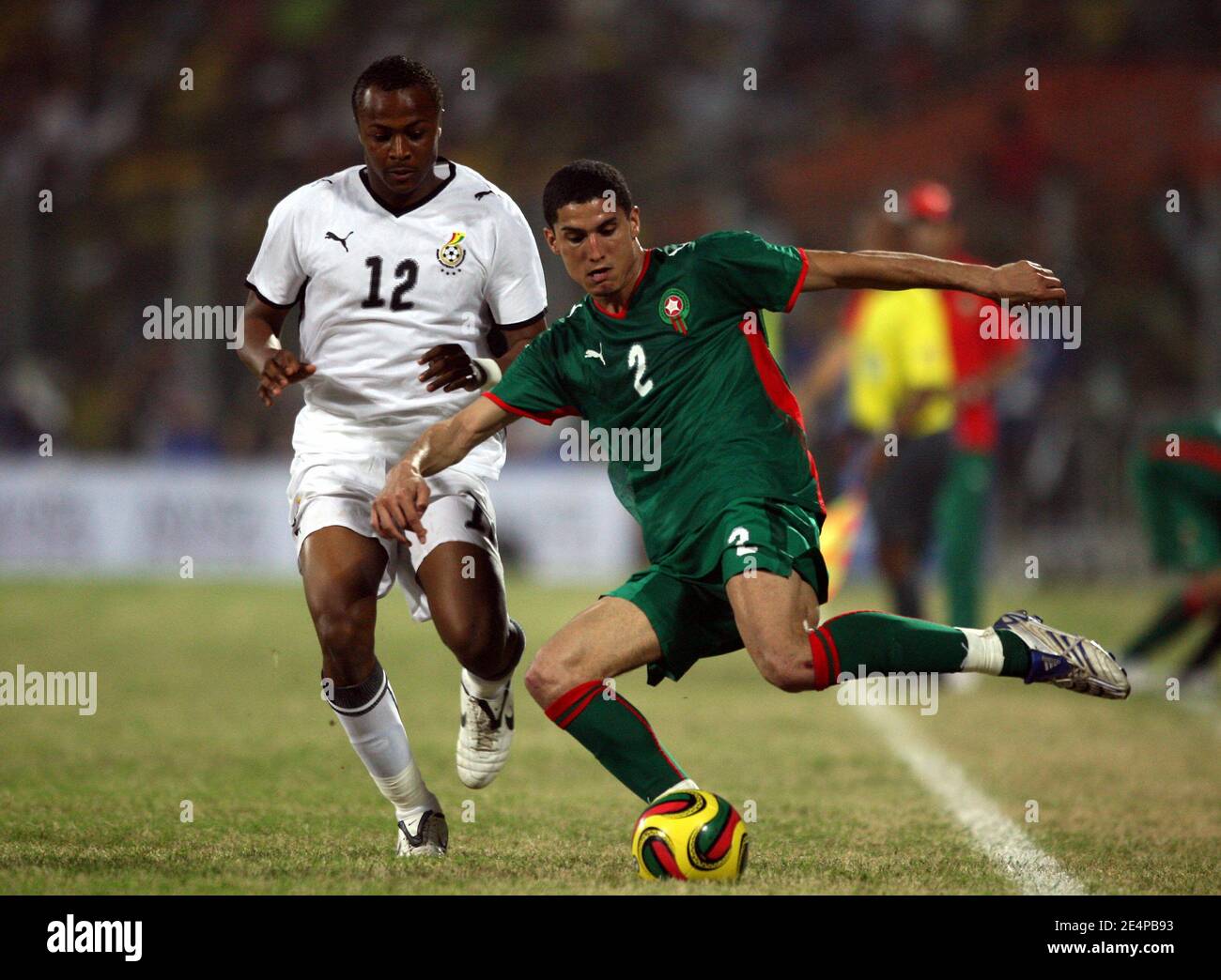 Ghana's Andre Ayew and Morocco's Michael Basser battle for the ball ...