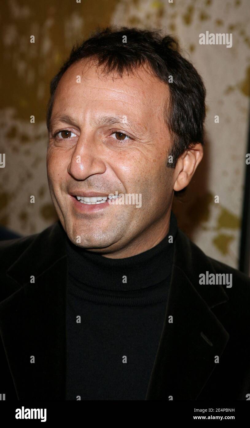 TV presenter Arthur poses at the Paris City Hall as Pierre Tchernia ...