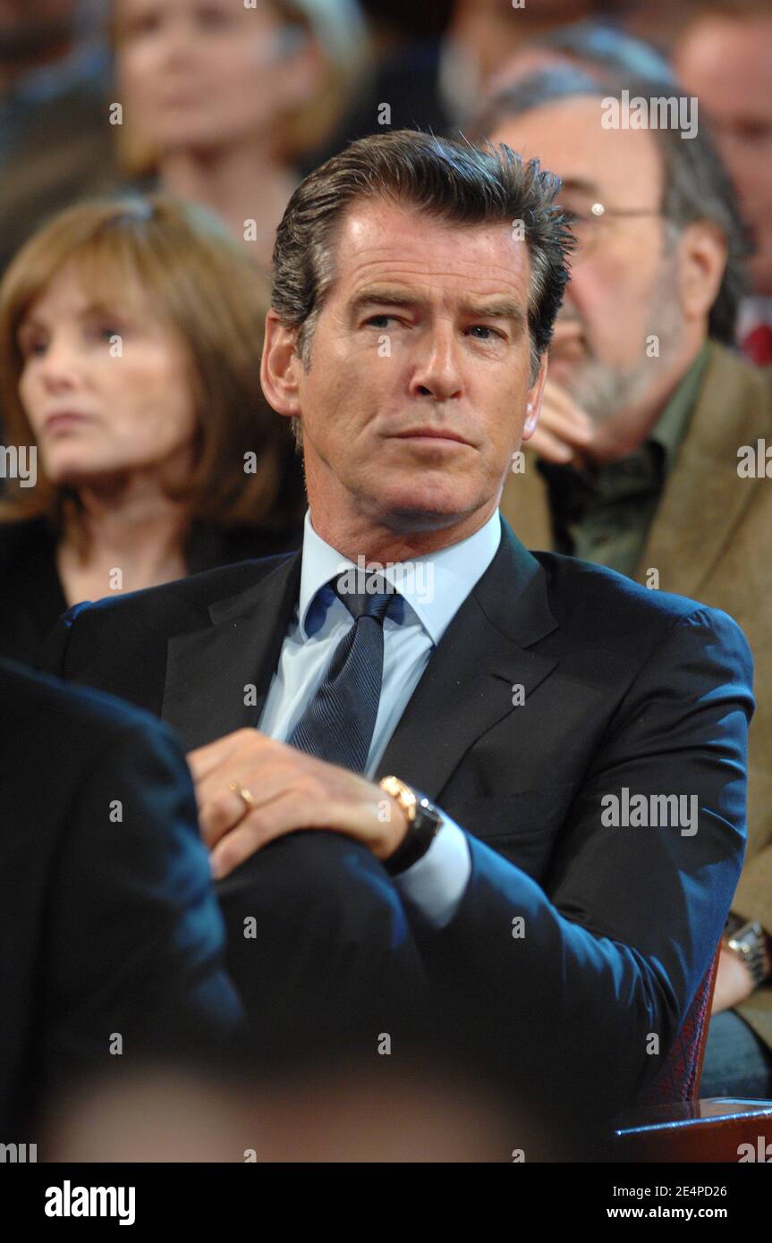 Pierce Brosnan sits in the audience to watch the Democratic ...