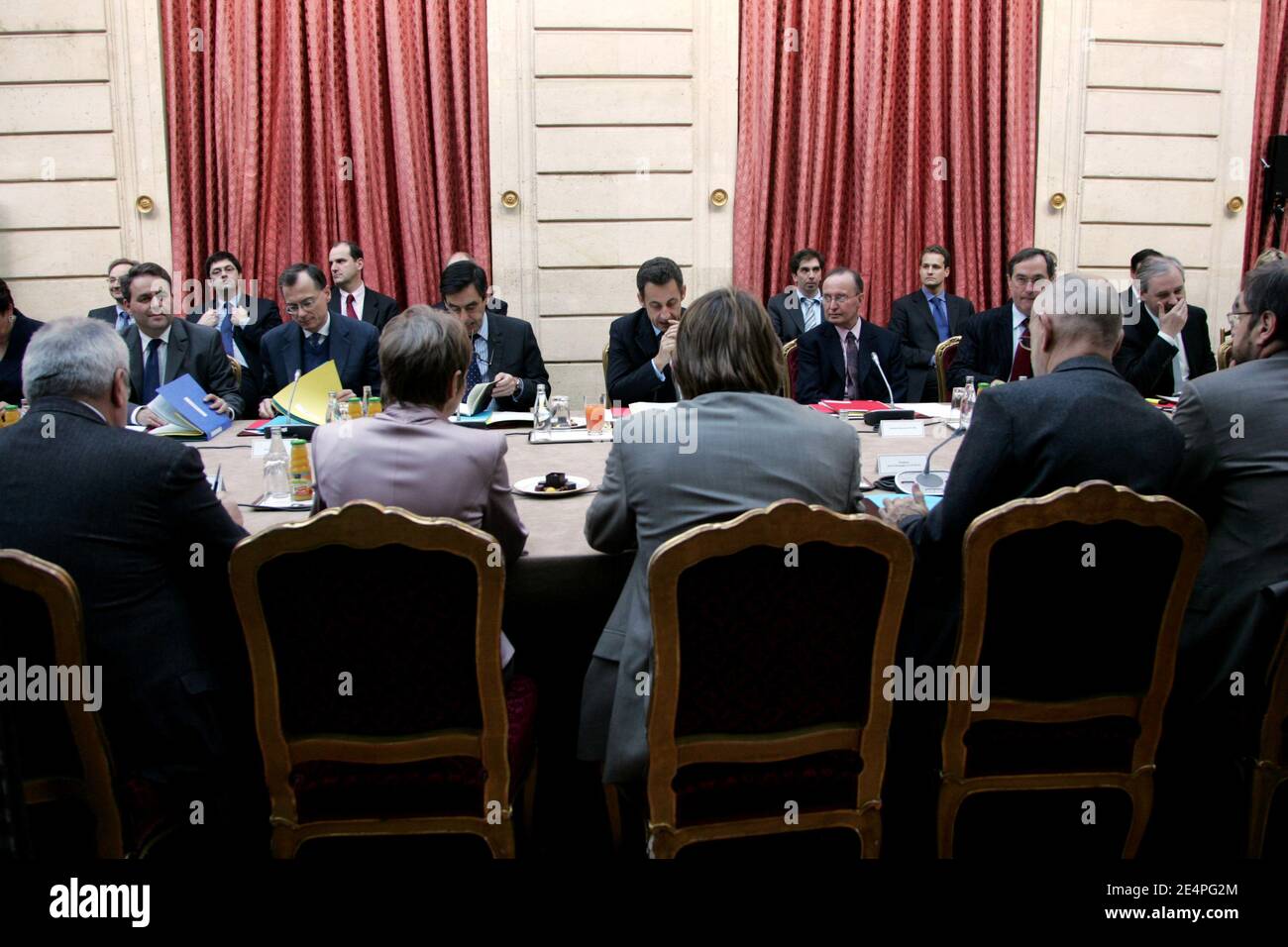 French President Nicolas Sarkozy receives Union leaders for a meeting ...