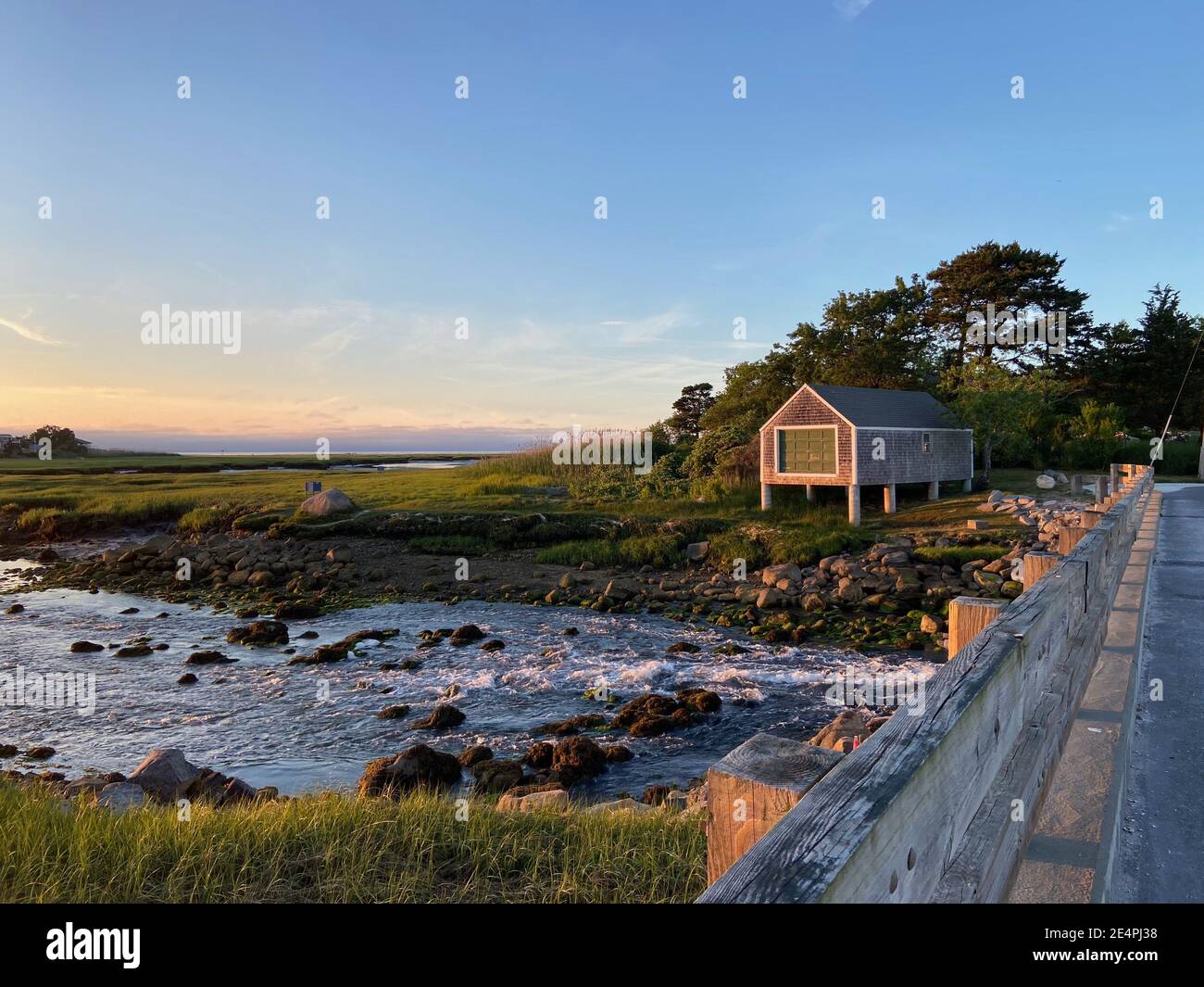 Rustic Barn Overlooks Cape Cod Sunset Stock Photo - Alamy