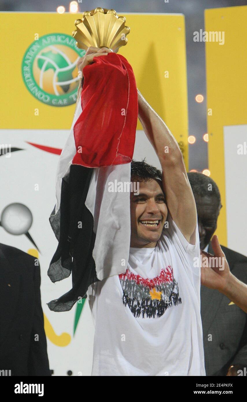 Captain of Egypt national football team Ahmed Hassan Kamel holds the trophy during the Final of ...