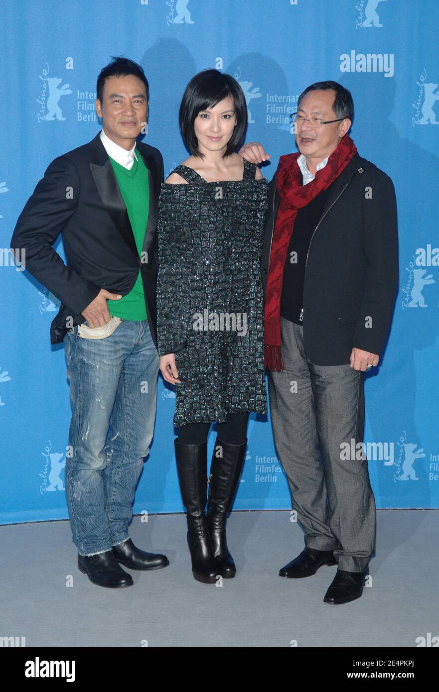Director Johnnie To and cast members Kelly Lin and Simon Yam pose for ...