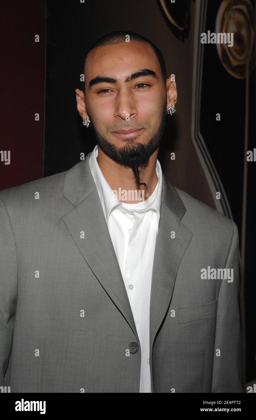 Singer La Fouine poses for pictures as he arrives to the 'L'Annee du ...
