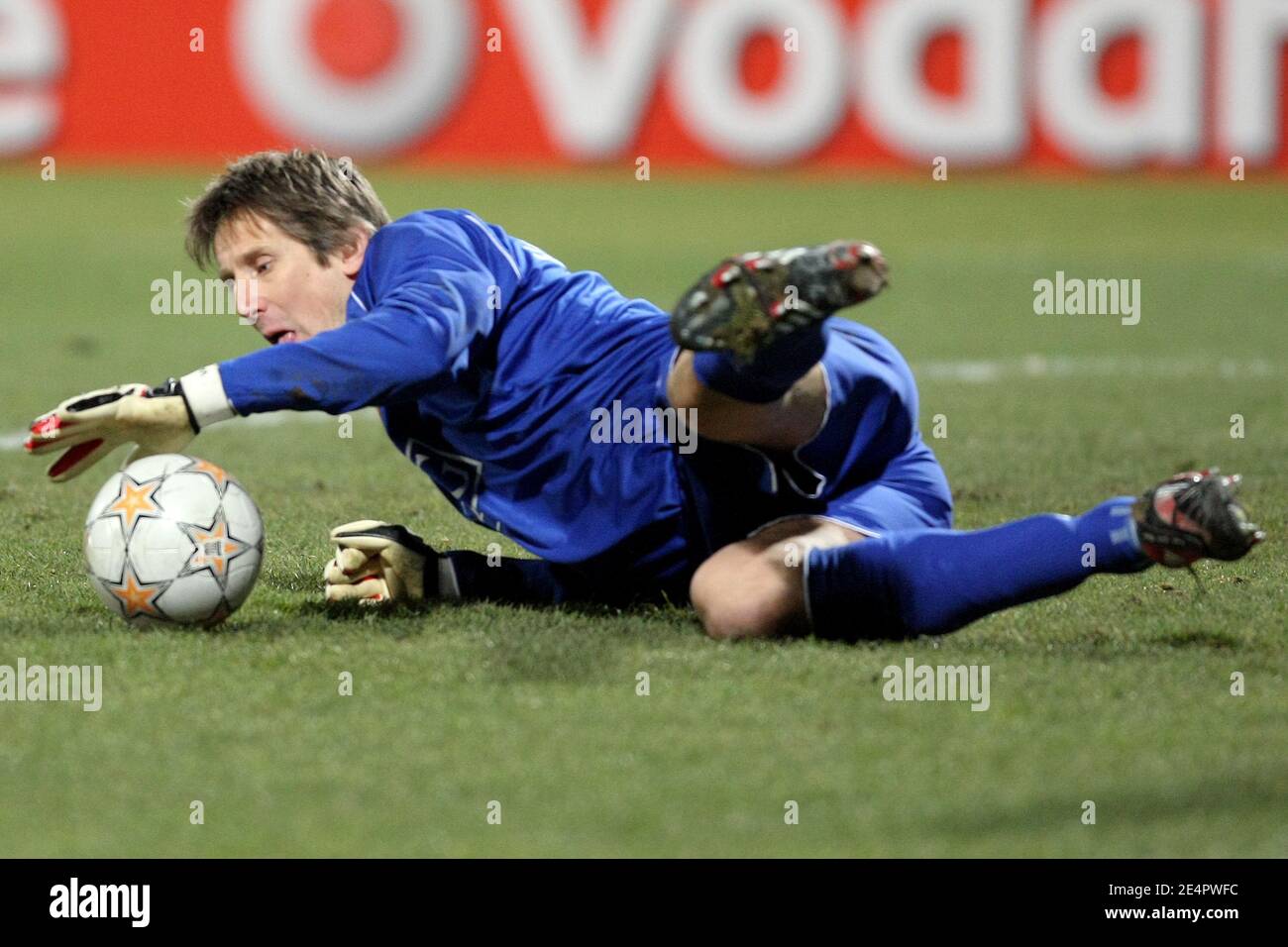 Manchester United goalkeeper Edwin Van der Sar stops the ball during ...