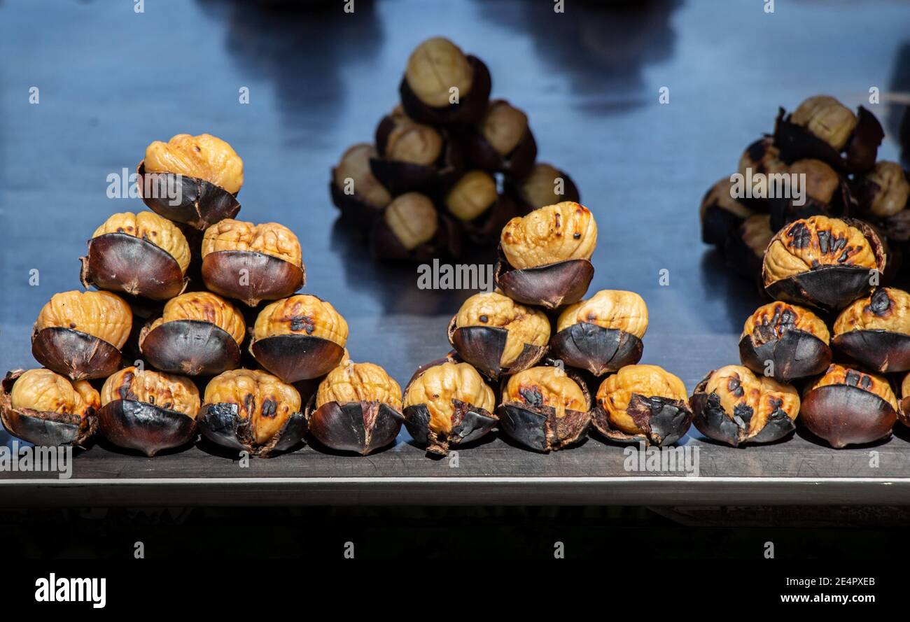 Roasted chestnuts cooked over fire hi-res stock photography and images ...