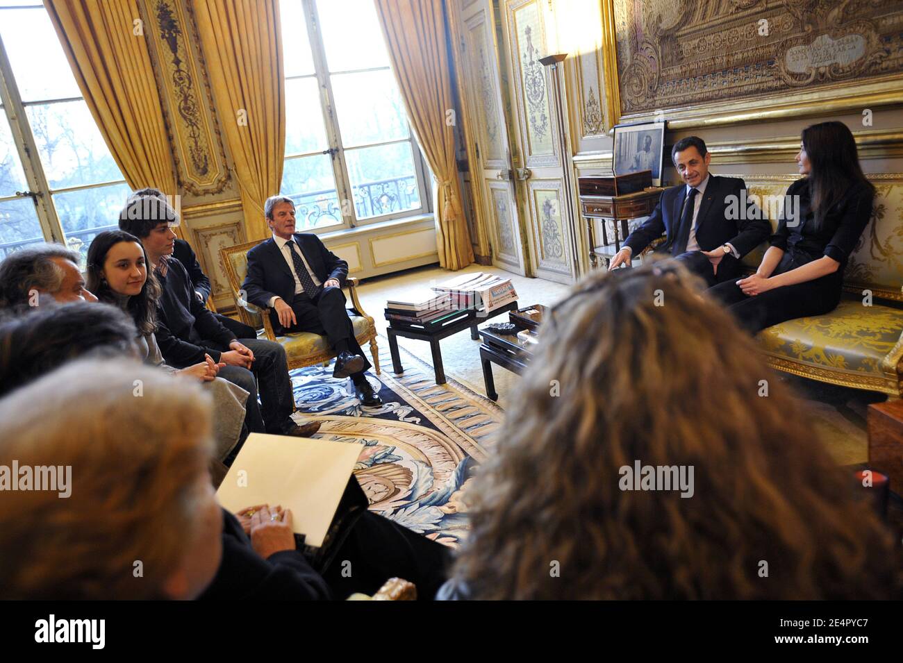 Nicolas Sarkozy and his wife Carla Bruni receive the Betancourt family ...