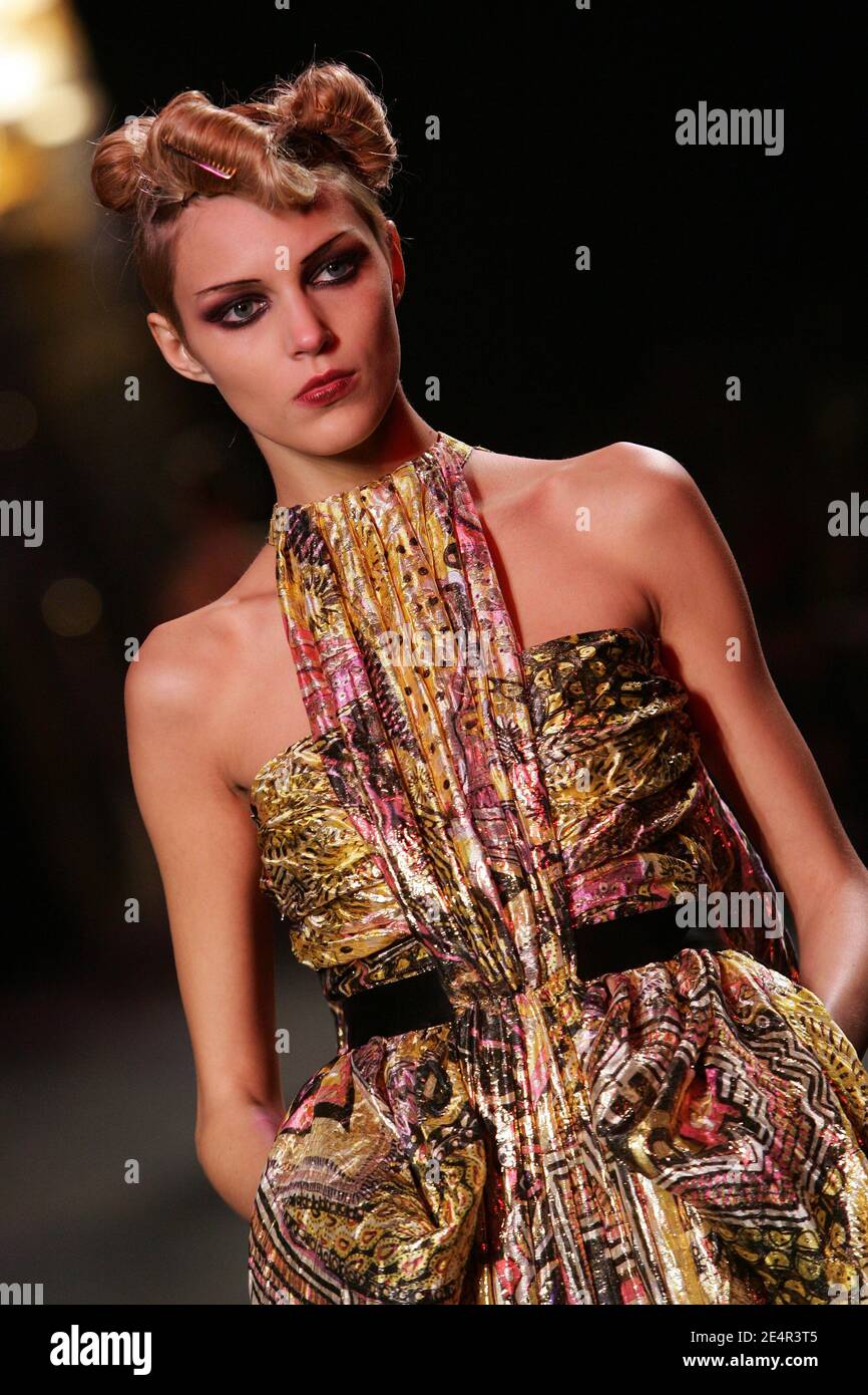 A model presents a creation by French designer Christian Lacroix for ...