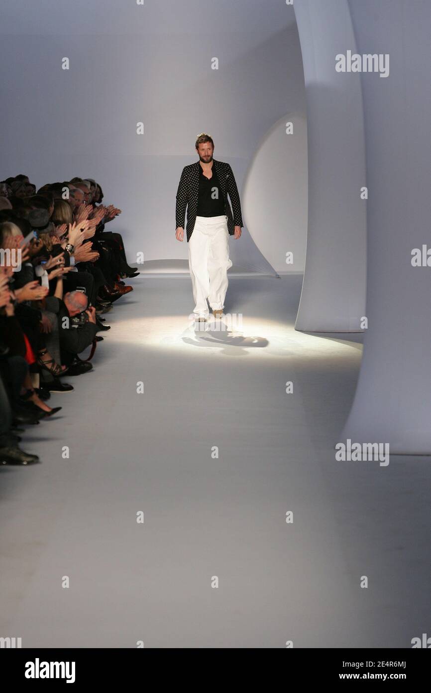 Designer Stefano Pilati makes an appearance after his presentation for ...