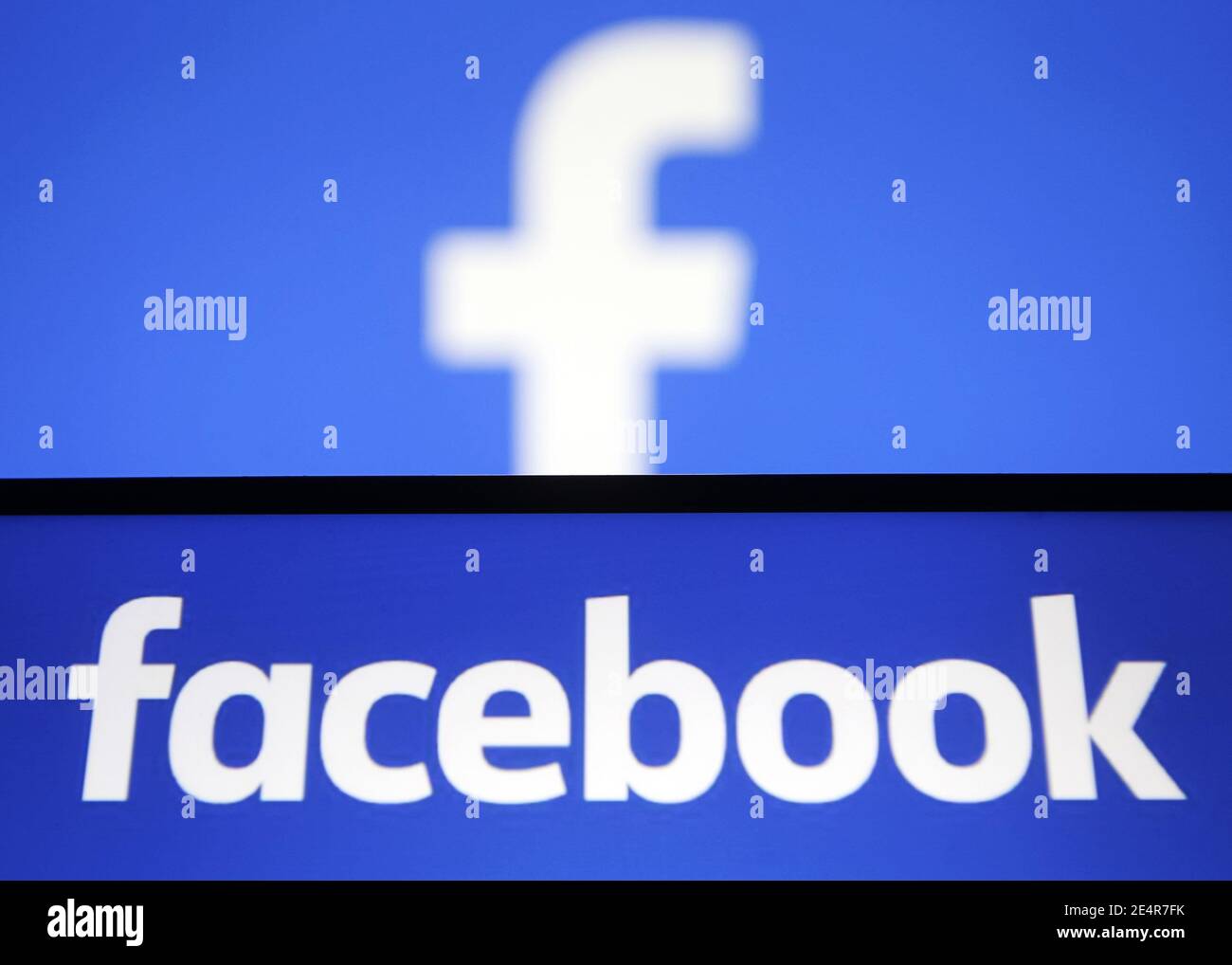 In this phot illustration the Facebook logo seen displayed on a mobile ...