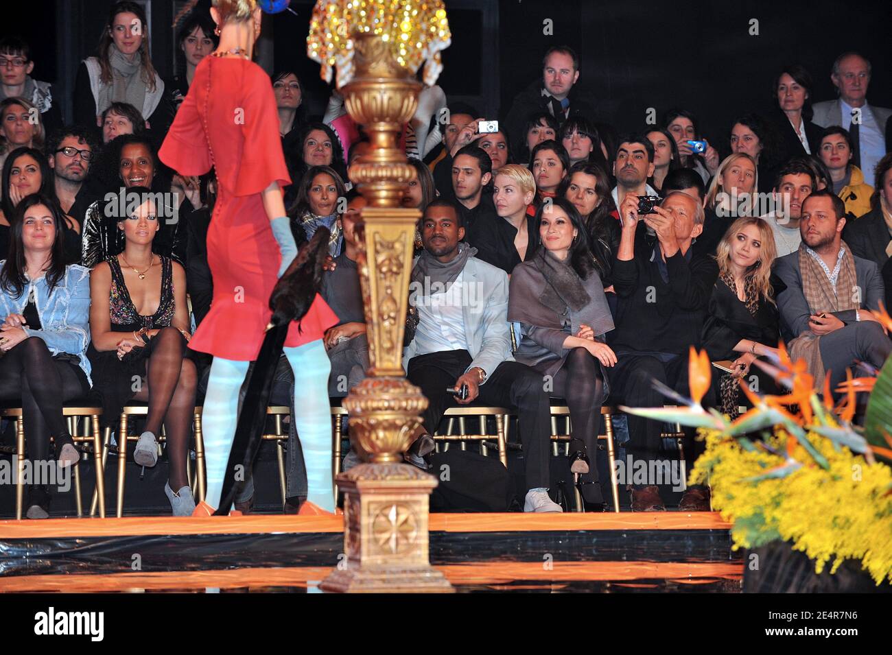 (L-R) Barbadian singer Rihanna, unidentified guest, US designer Alexis ...