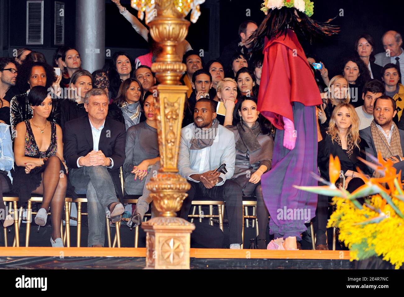 (L-R) Barbadian singer Rihanna, unidentified guest, US designer Alexis ...