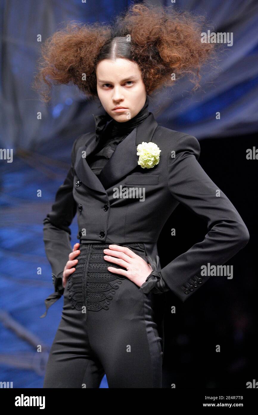 A model displays a creation by British fashion designer Alexander ...