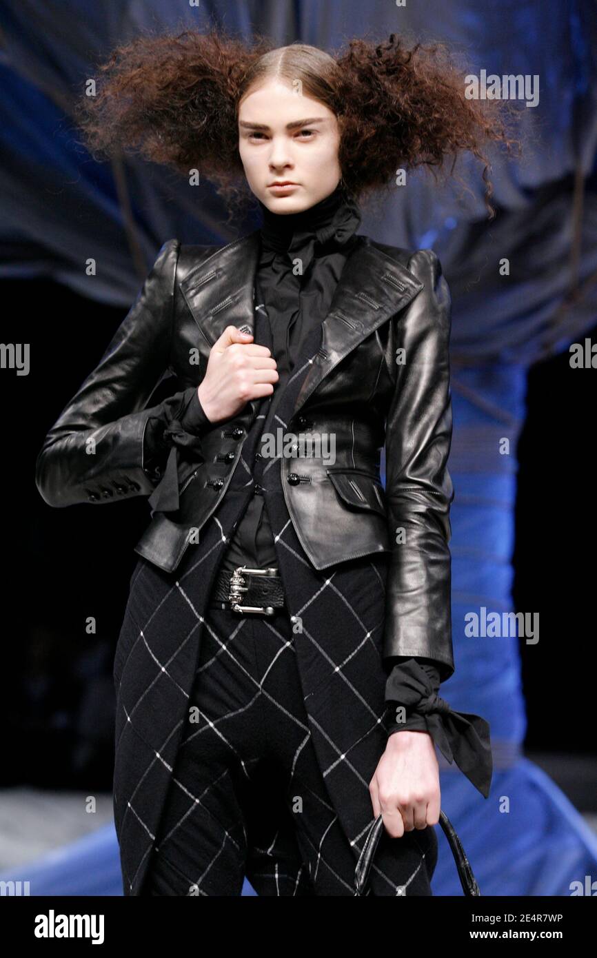 A model displays a creation by British fashion designer Alexander ...