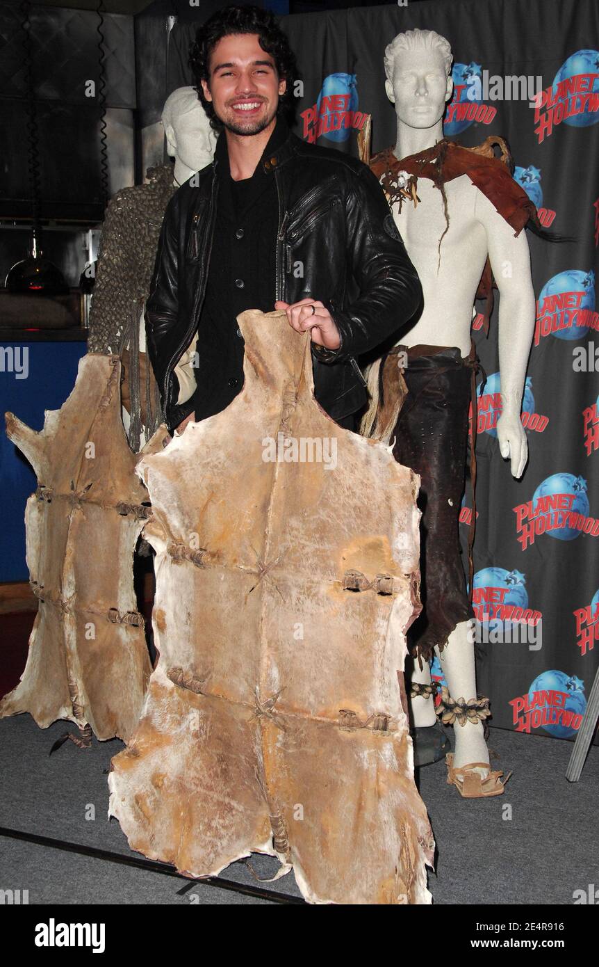 Actor Steven Strait poses as he donates costumes from his upcoming film ...