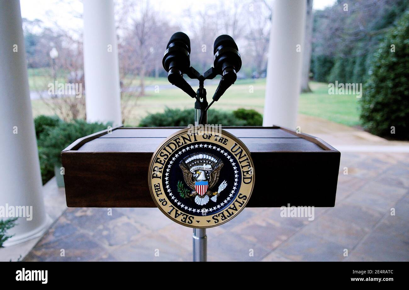 A podium with the seal of the President of the United States stands ...