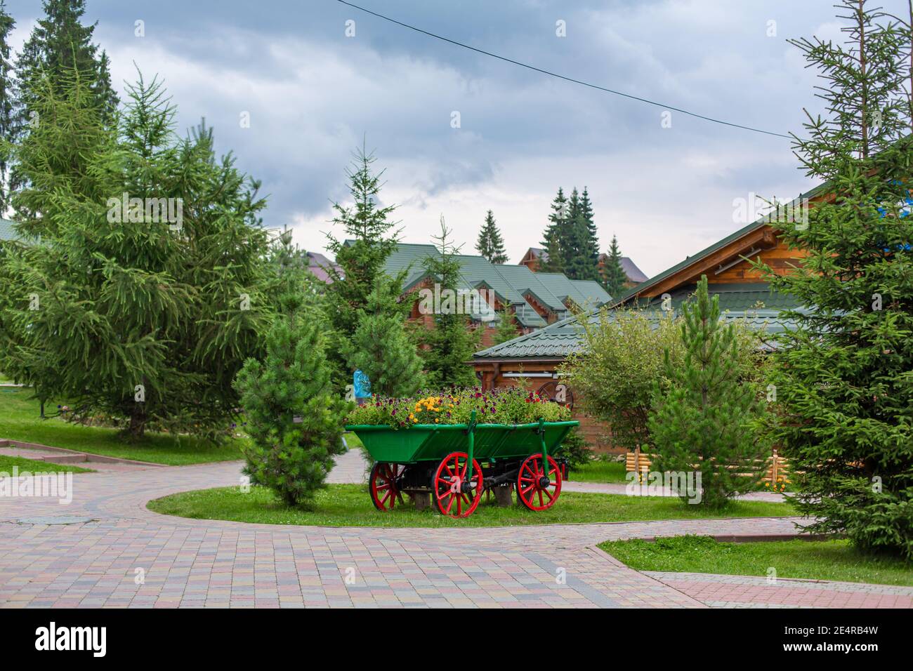 Old style cart with green bush for outdoor backyard decoration Stock ...