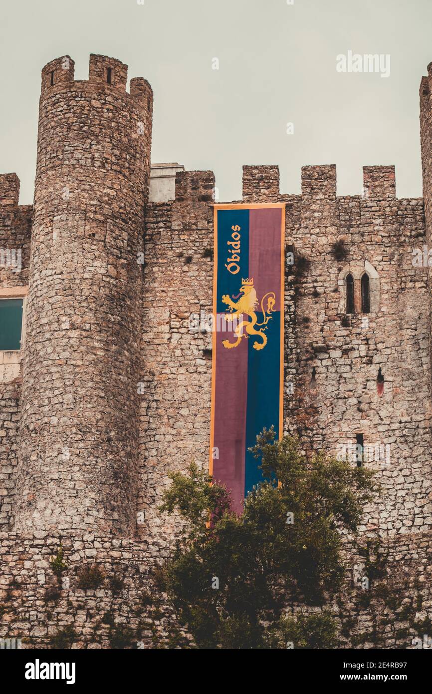 OBIDOS, PORTUGAL - 08-09-2020 : Old Castle and colorful narrow streets ...