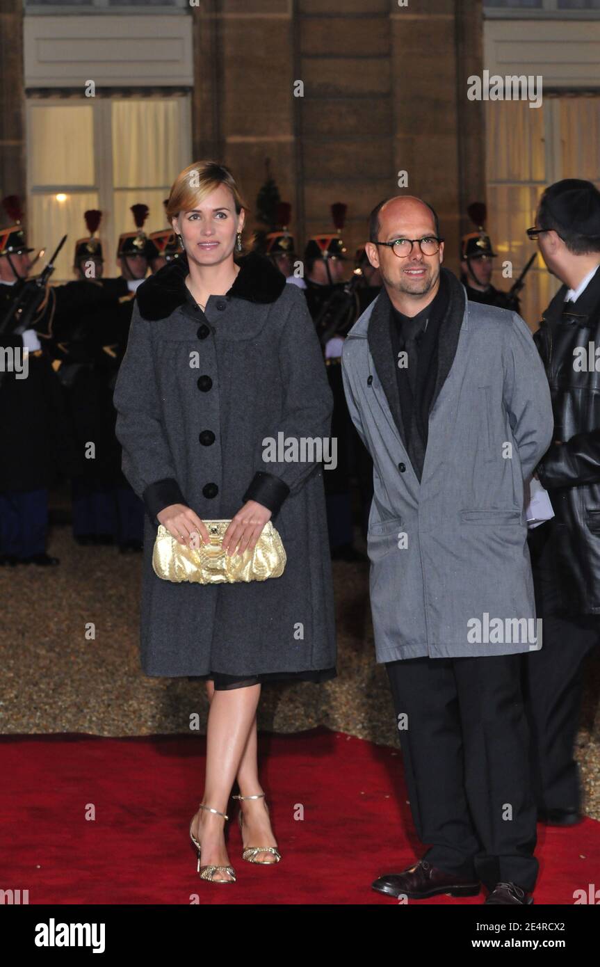 French actress Judith Godreche and husband Maurice Barthelemy arrive ...