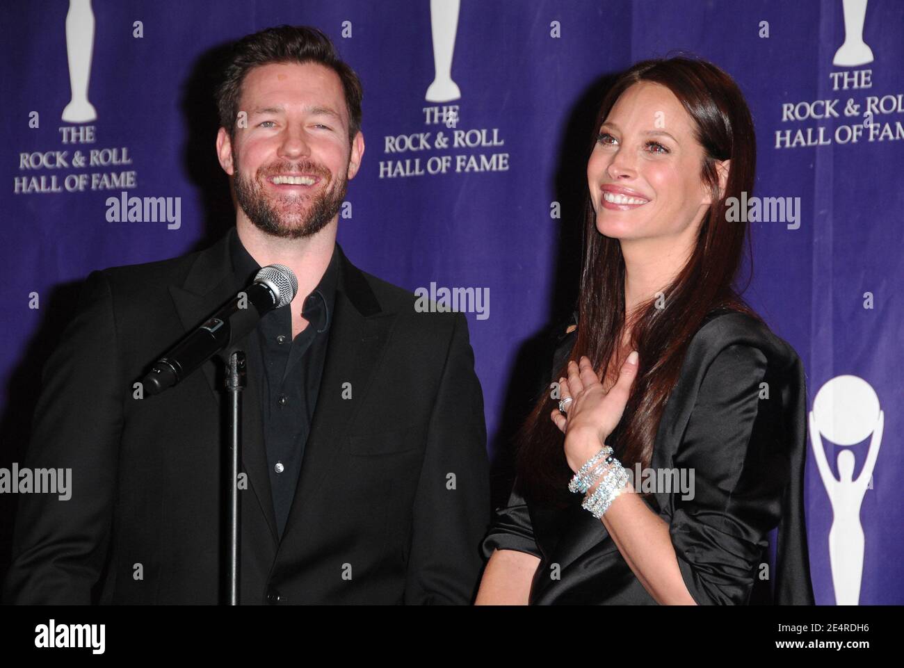 Model Christy Turlington and husband actor Ed Burns pose in the press ...