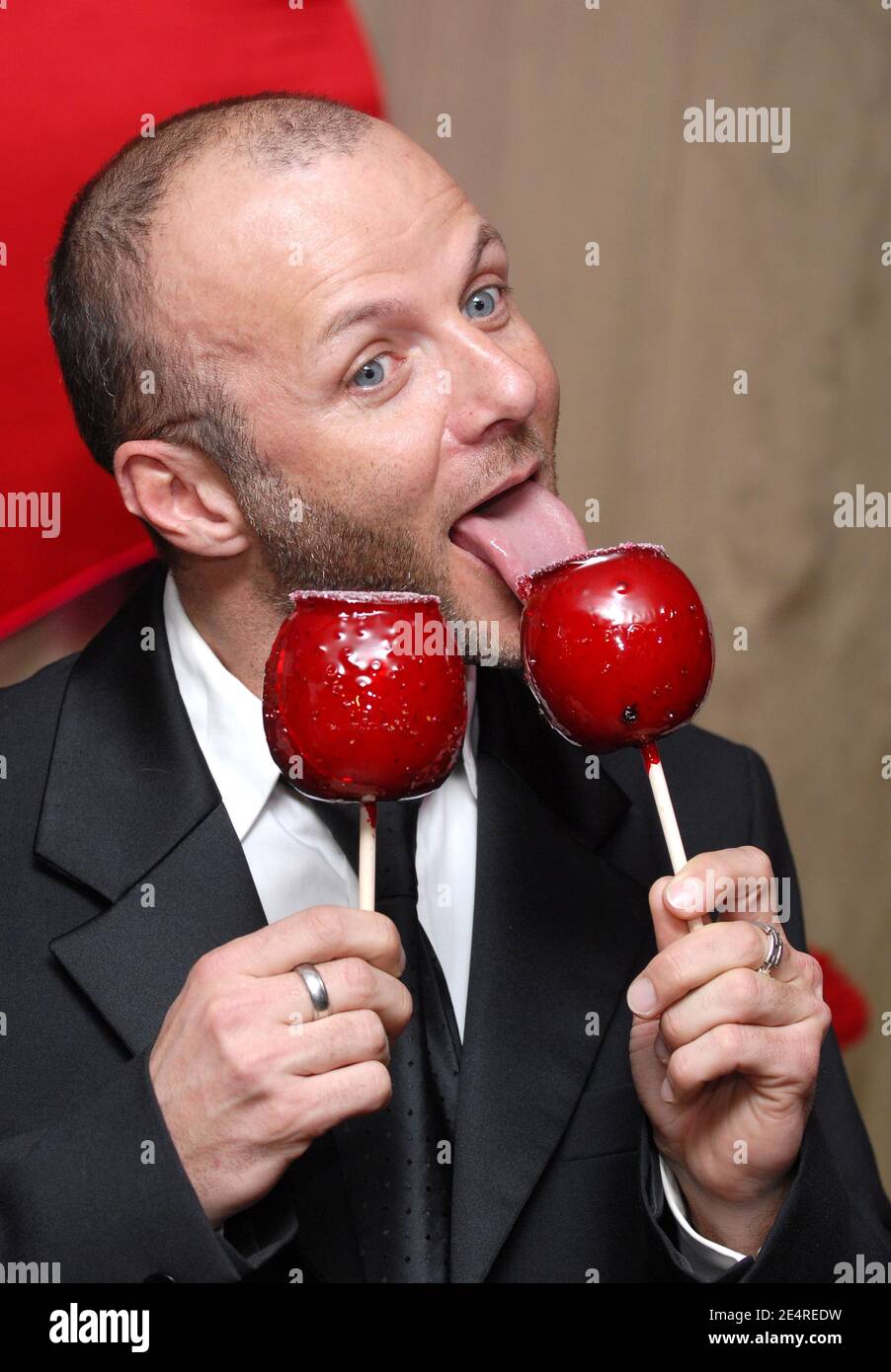 Cast member Pierre-Francois Martin-Laval poses for pictures as he ...