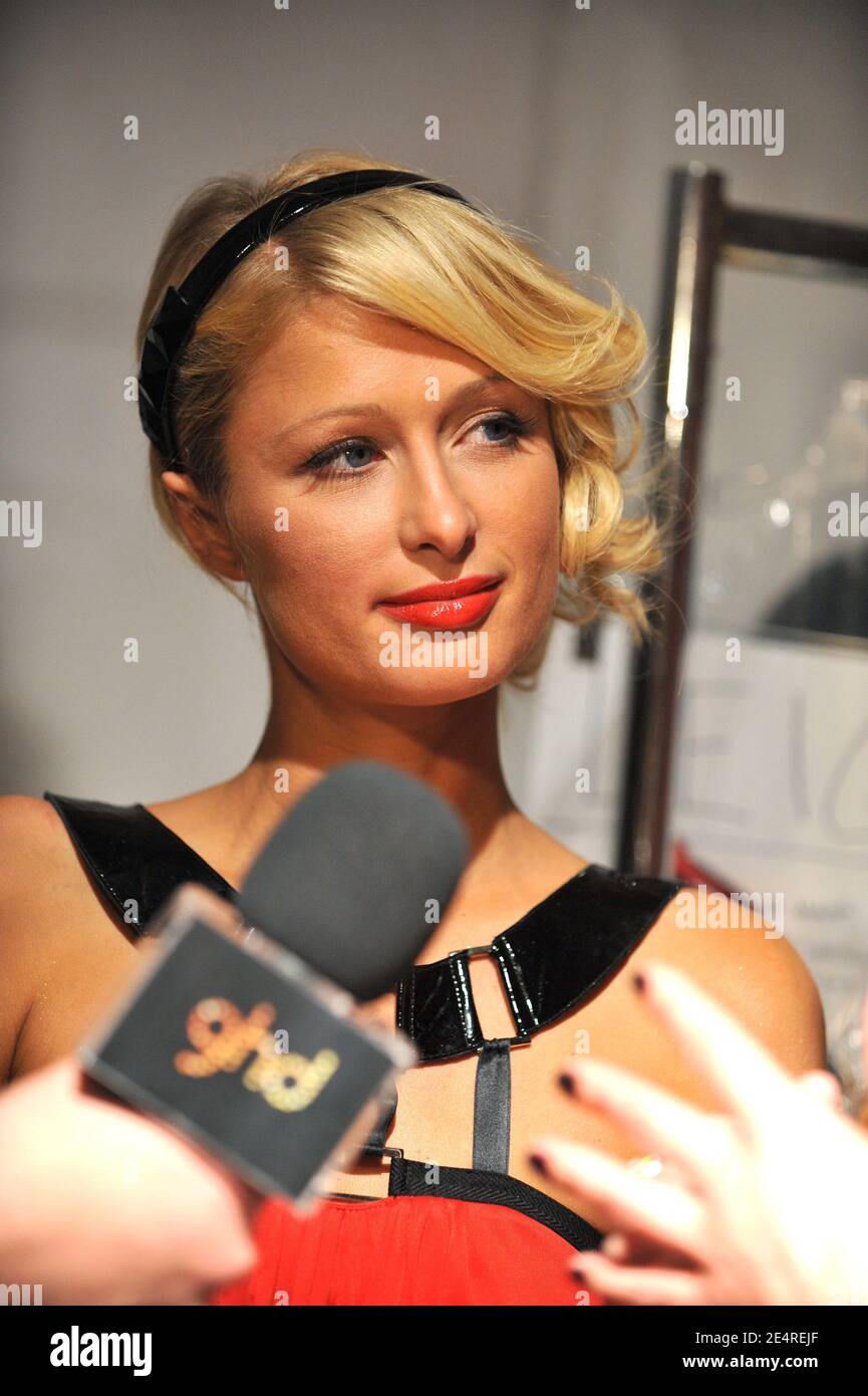 Paris Hilton poses backstage of the Nicholai By Nicky Hilton Fall 2008 ...