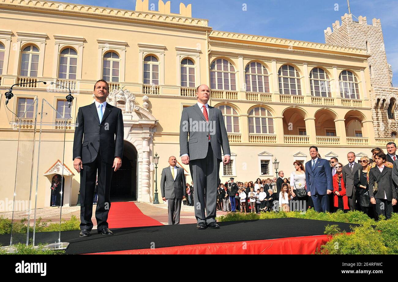 Prince Albert II of Monaco stands near the city mayor during Prince ...
