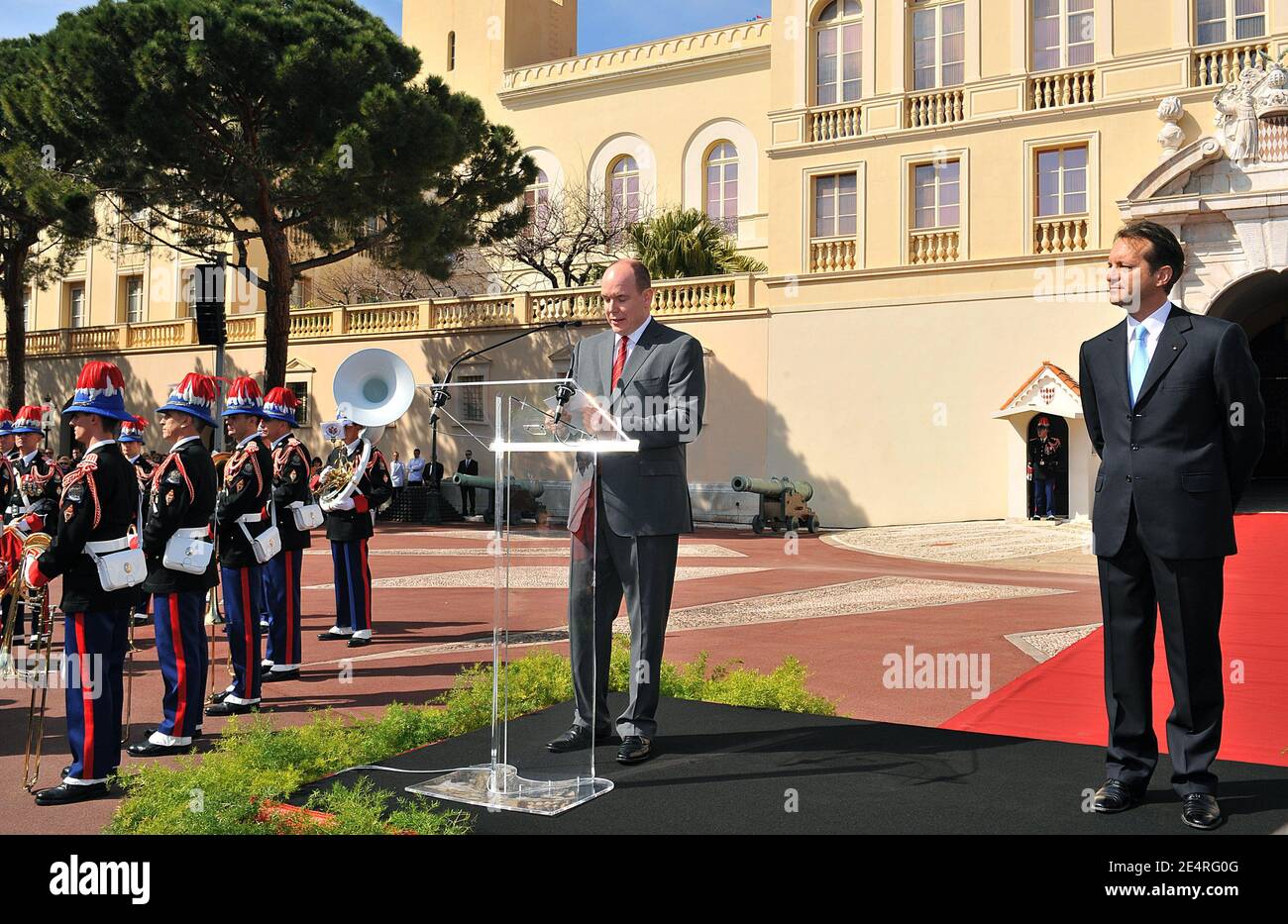 City Mayor Georges Marsan listens Prince Albert II of Monaco giving his ...