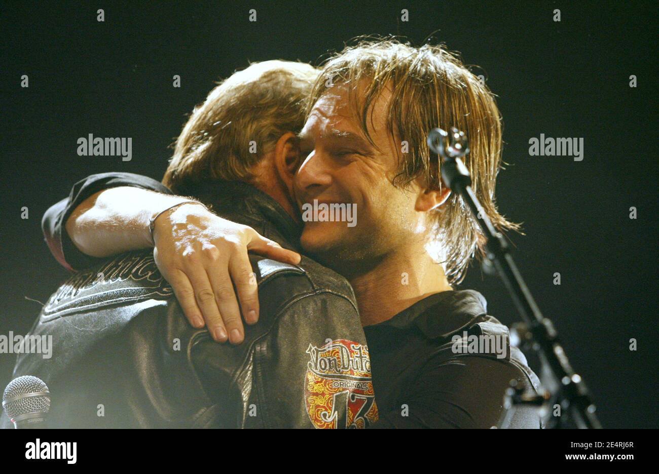 David Hallyday and his father Johnny Hallyday on stage at the Cigale in ...