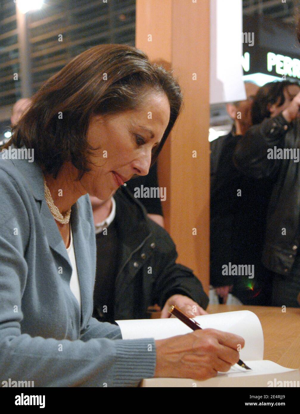 French socialist figure Segolene Royal signs copies of her book 'Ma ...