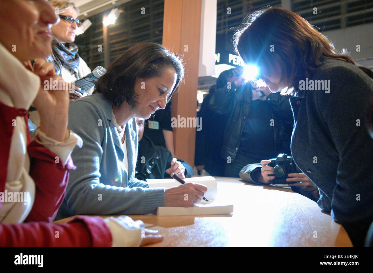 French socialist figure Segolene Royal signs copies of her book 'Ma ...
