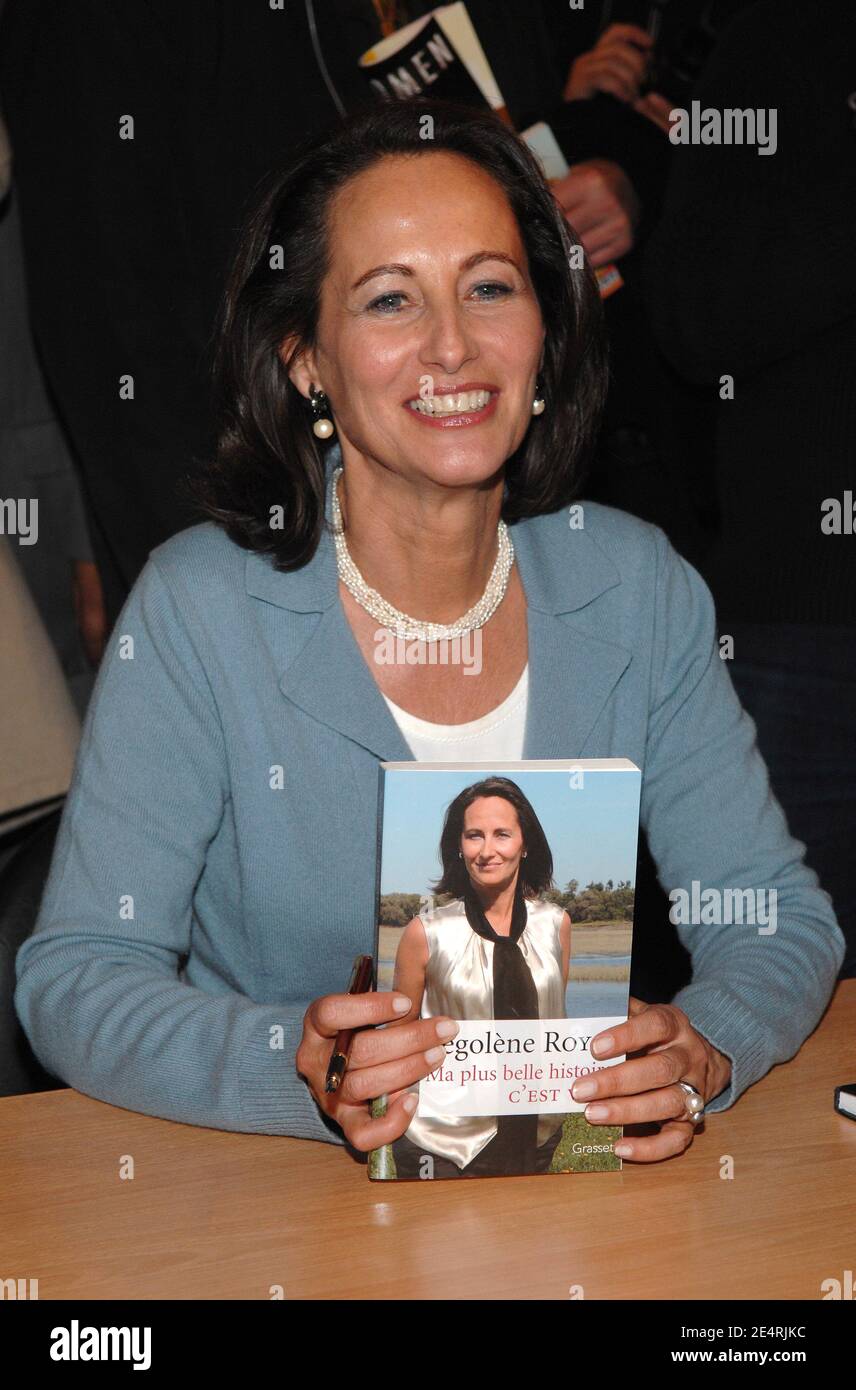 French socialist figure Segolene Royal signs copies of her book 'Ma ...