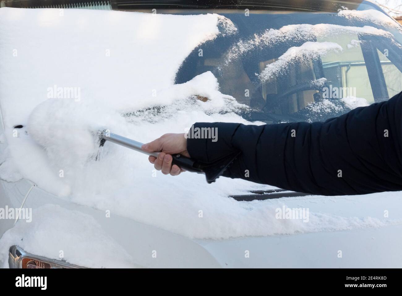 Closeup man shoveling snow hi-res stock photography and images - Alamy