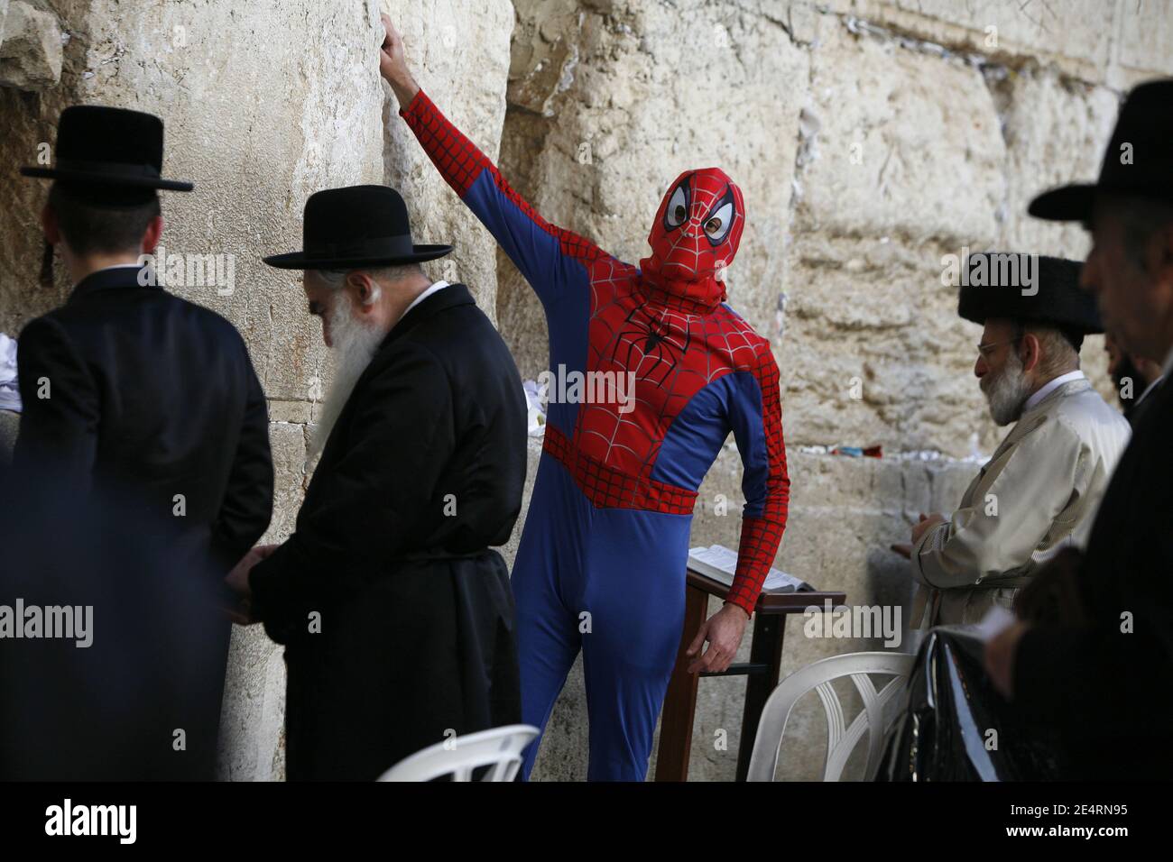 An Israeli dressed as Spiderman during the celebration the festival of ...