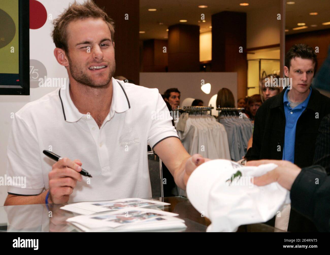 Tennis champion Andy Roddick signs memorabilia as Bloomingdale's ...