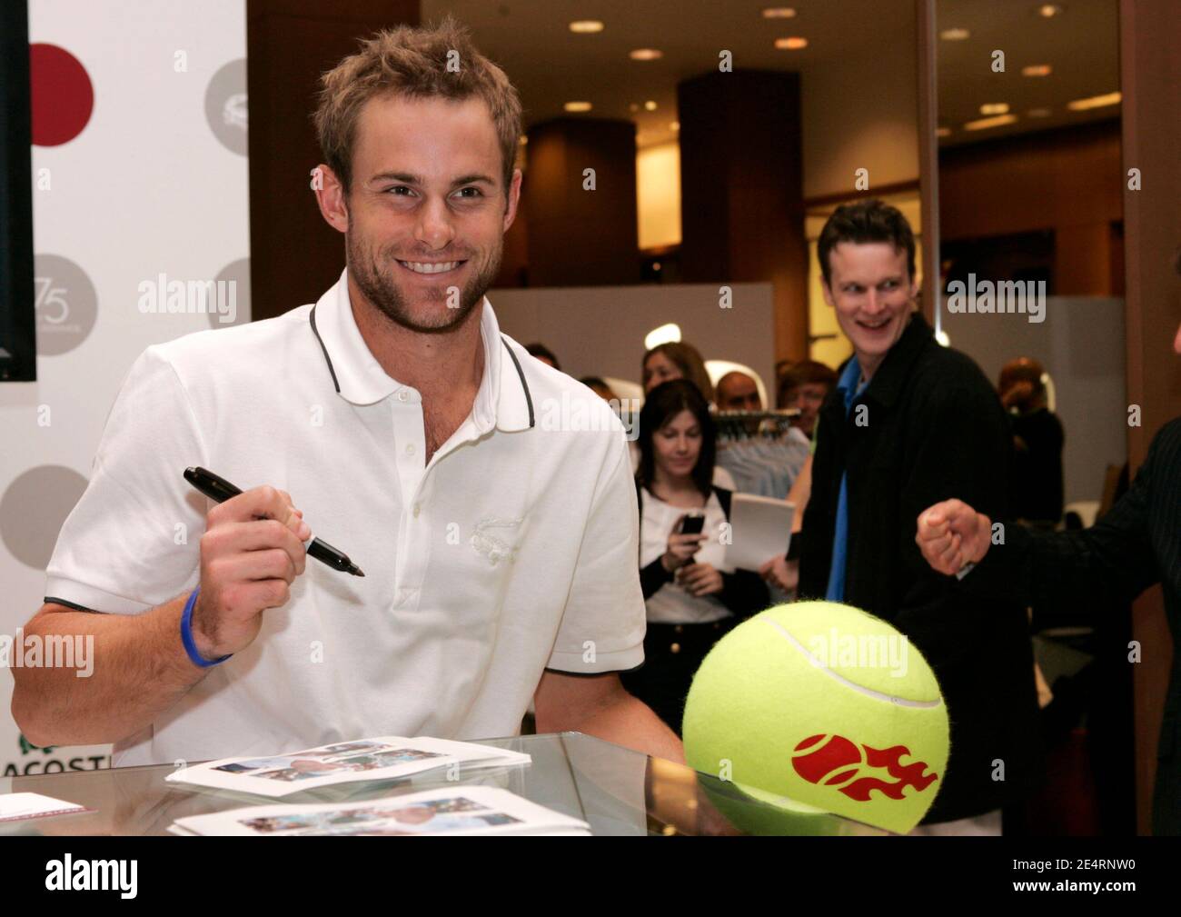 Tennis champion Andy Roddick signs memorabilia as Bloomingdale's ...